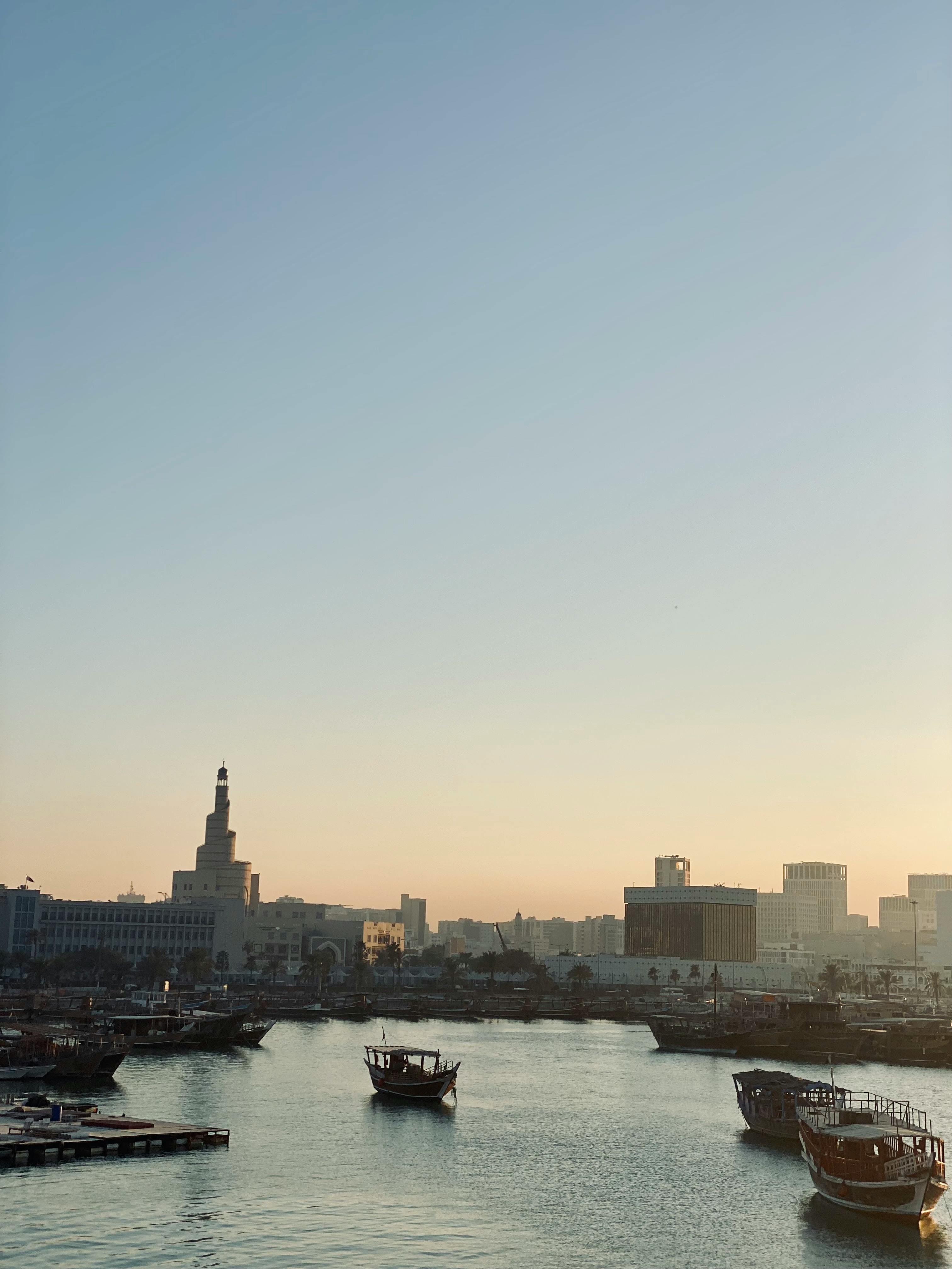 Boats in River in Qatar During Sunset · Free Stock Photo