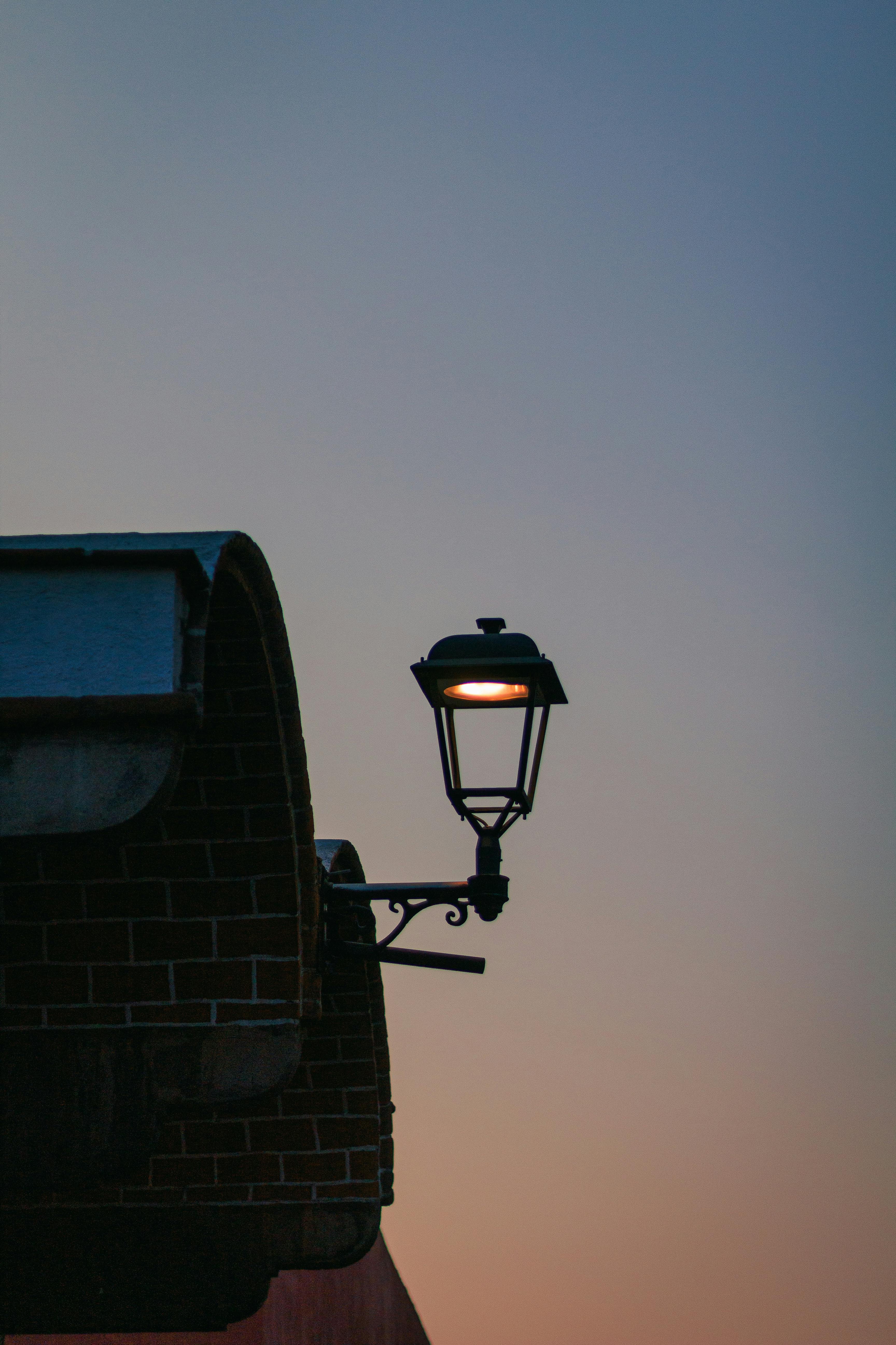 Silhouette of Lantern During Sunset · Free Stock Photo