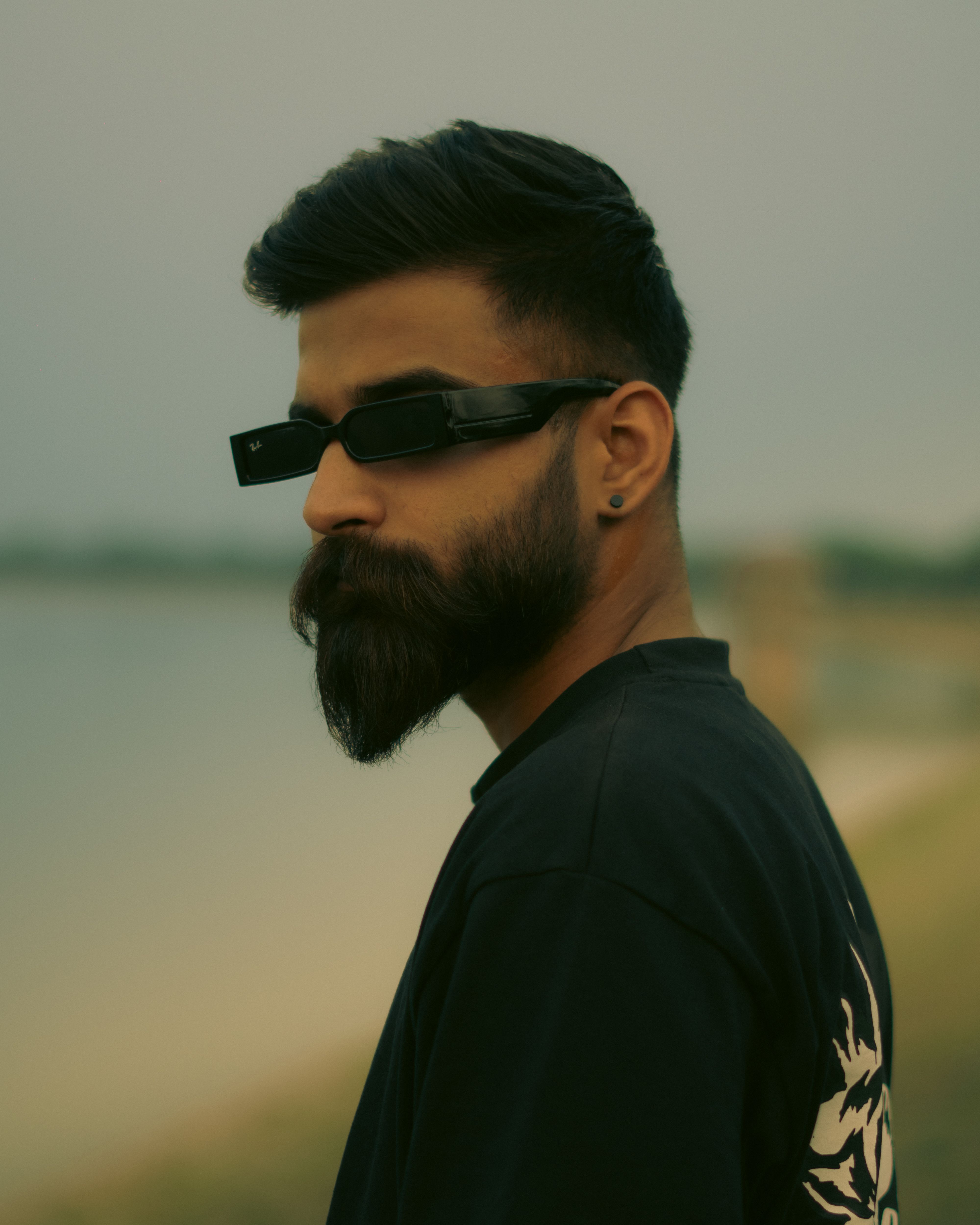 Photo of a Bearded Man Wearing Sunglasses · Free Stock Photo