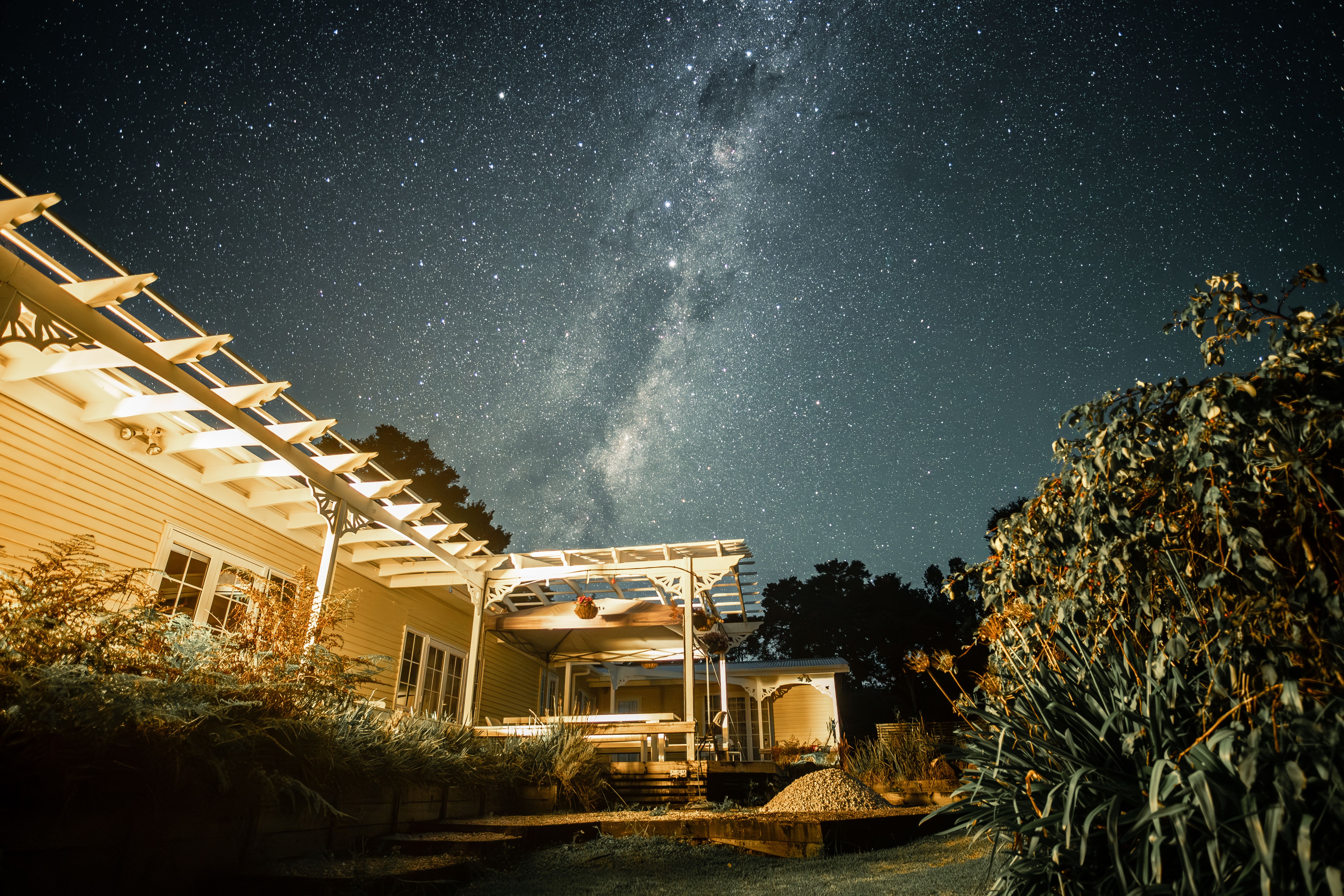 The milky way over the house at night · Free Stock Photo