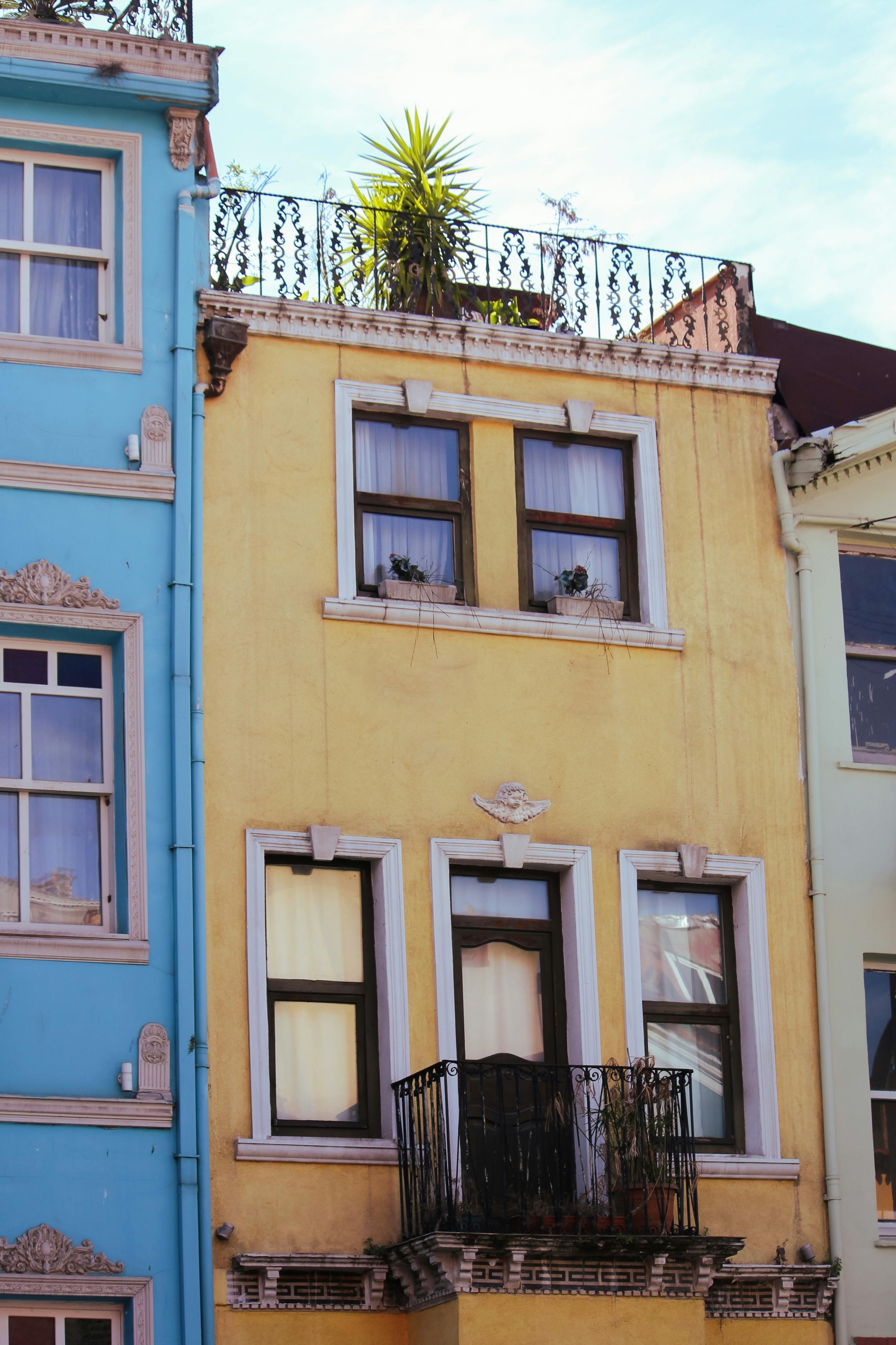 Windows in Colorful Tenements · Free Stock Photo