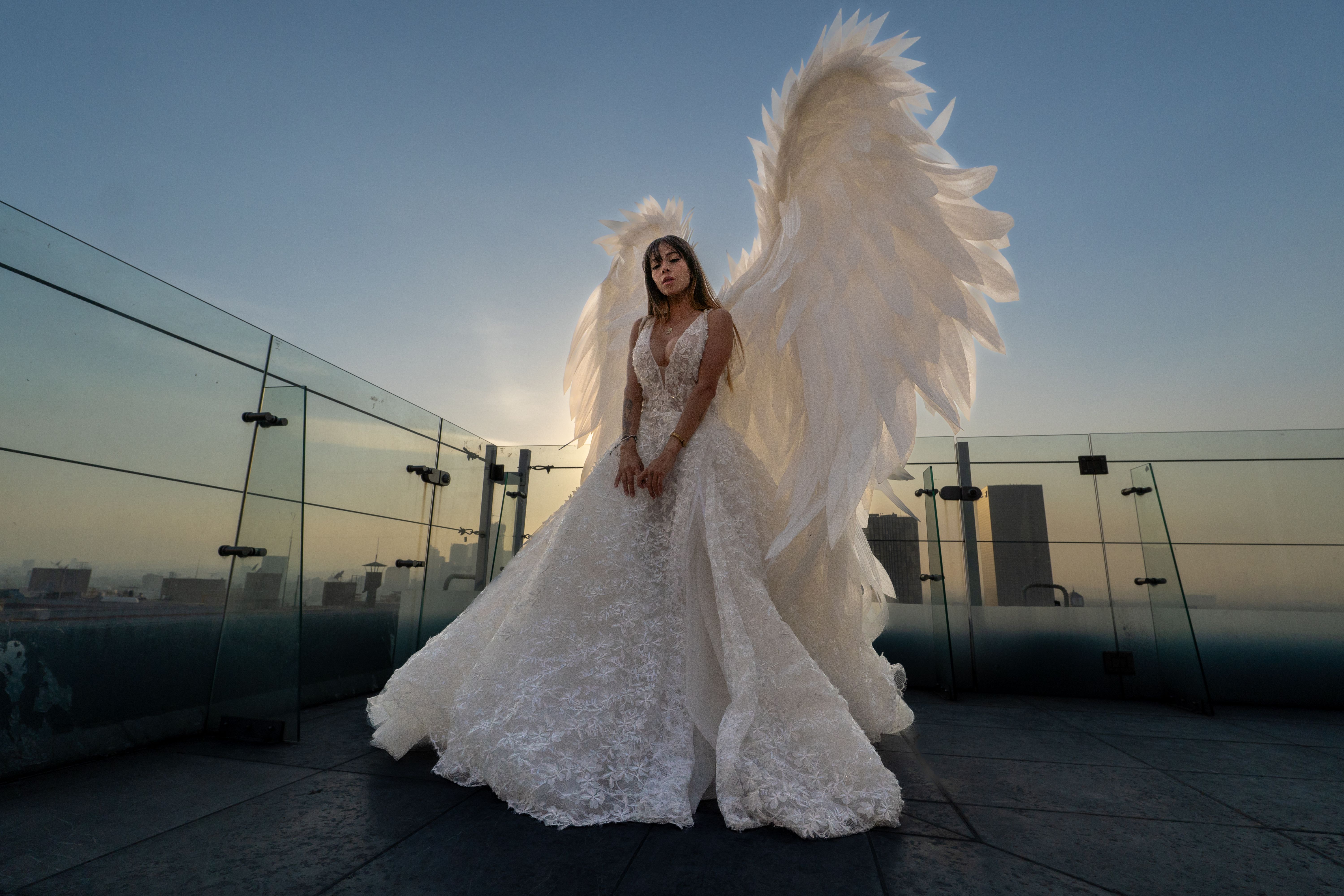 Woman Posing in a Costume on an Angel on a Terrace by the Sunset · Free ...
