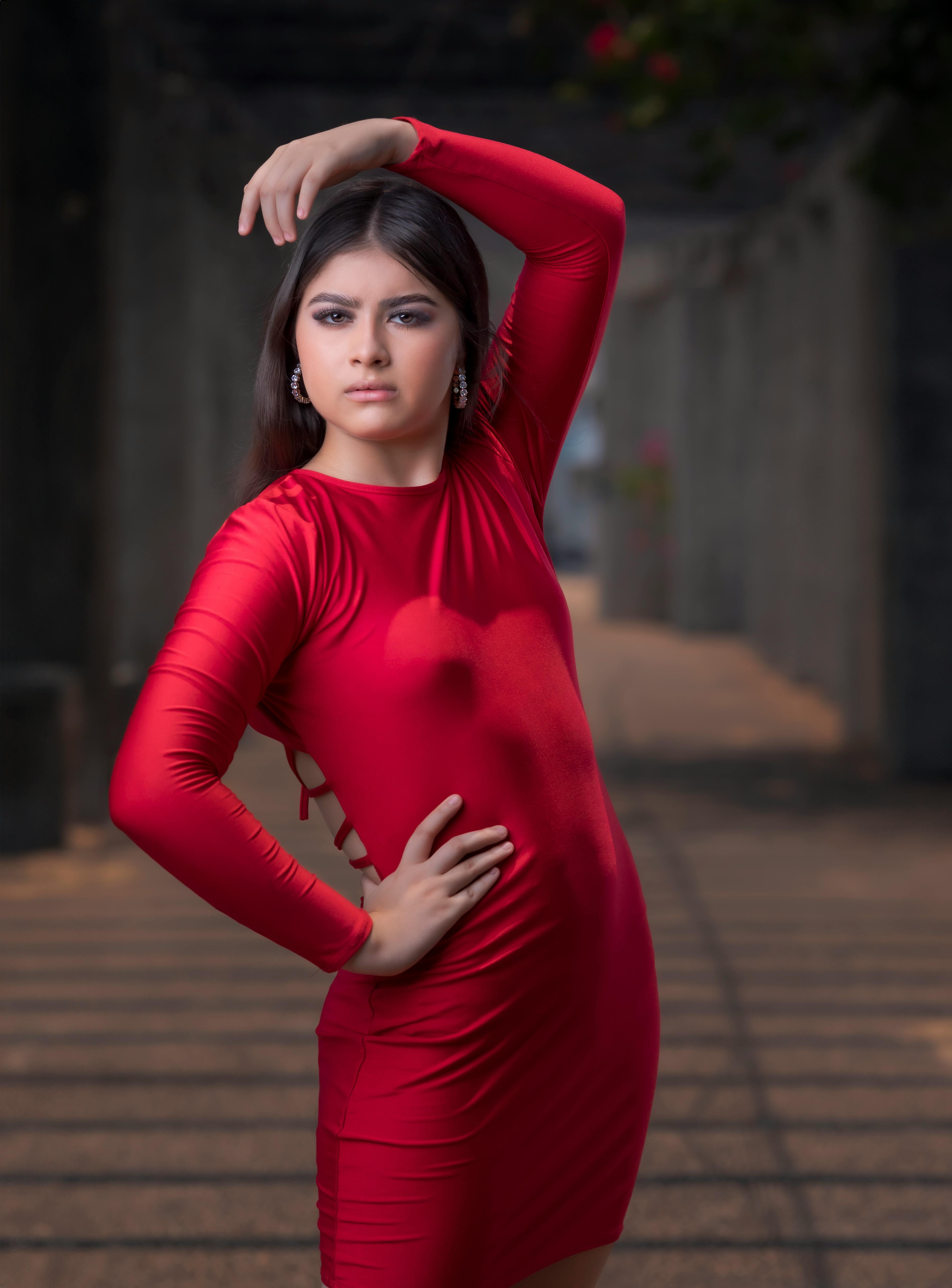 Young Brunette Woman in Black PVC Matrix Style Trench Coat Posing at a ...