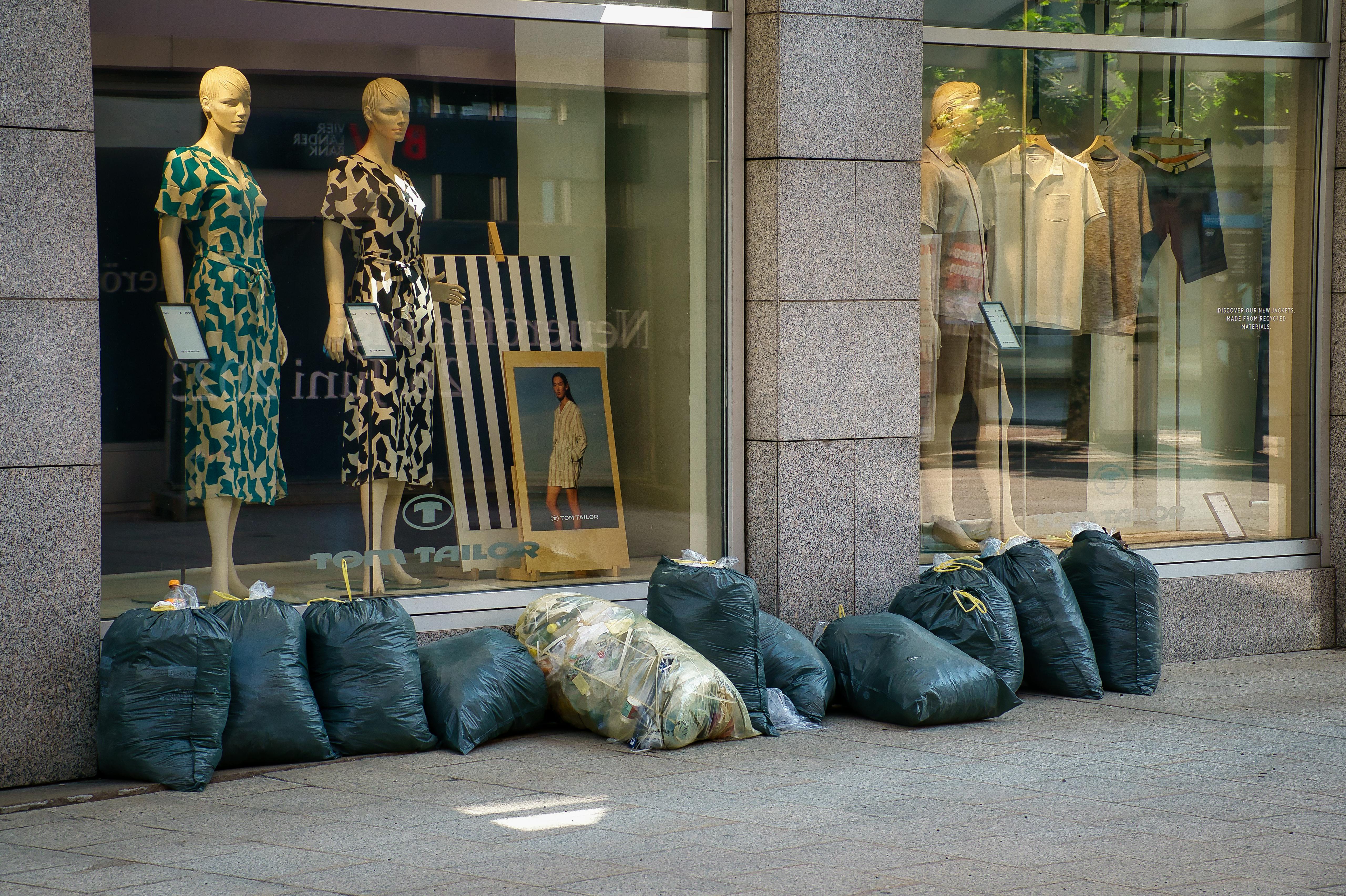 Trash and Window Display · Free Stock Photo