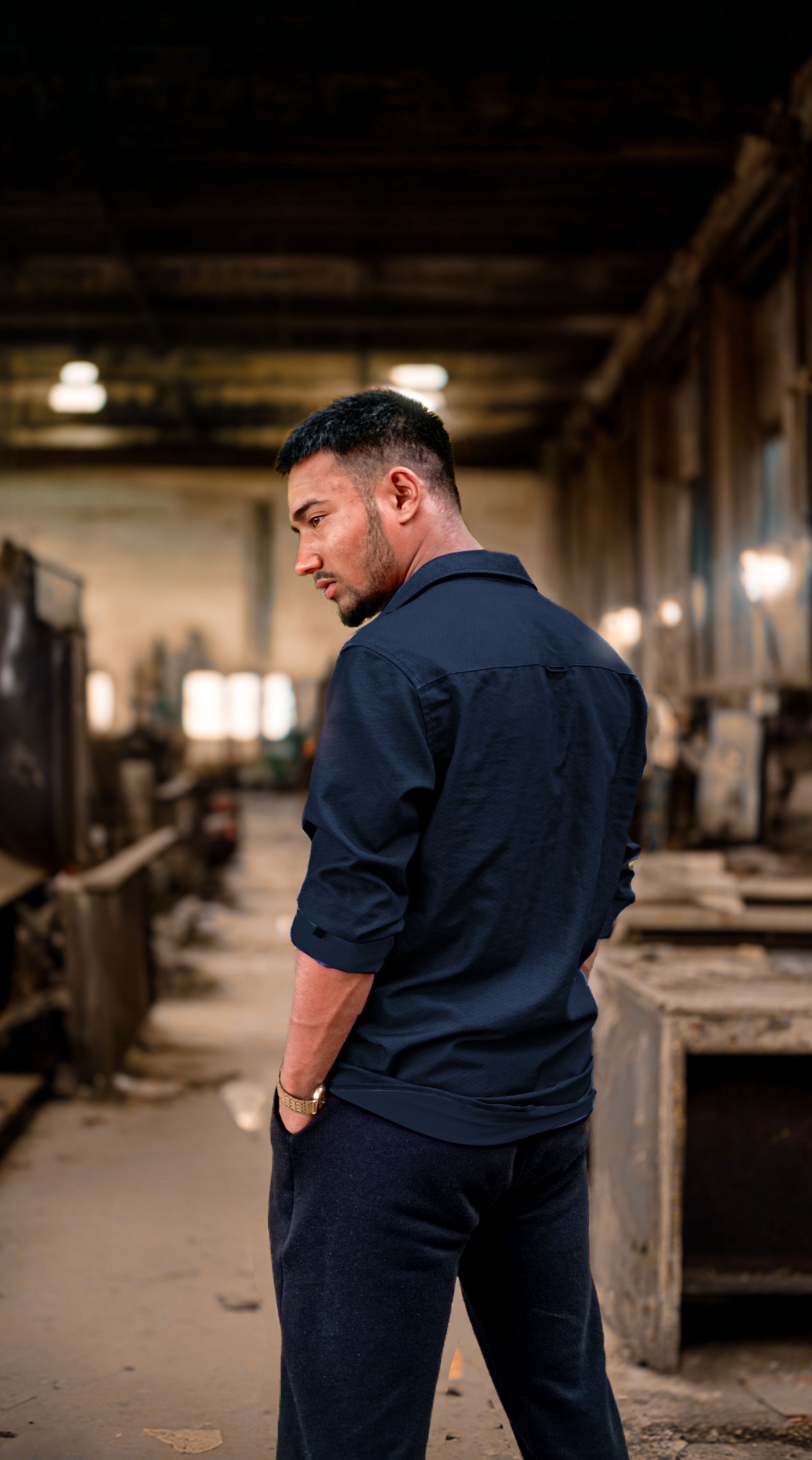 Back of a Man Wearing a Blue Shirt · Free Stock Photo