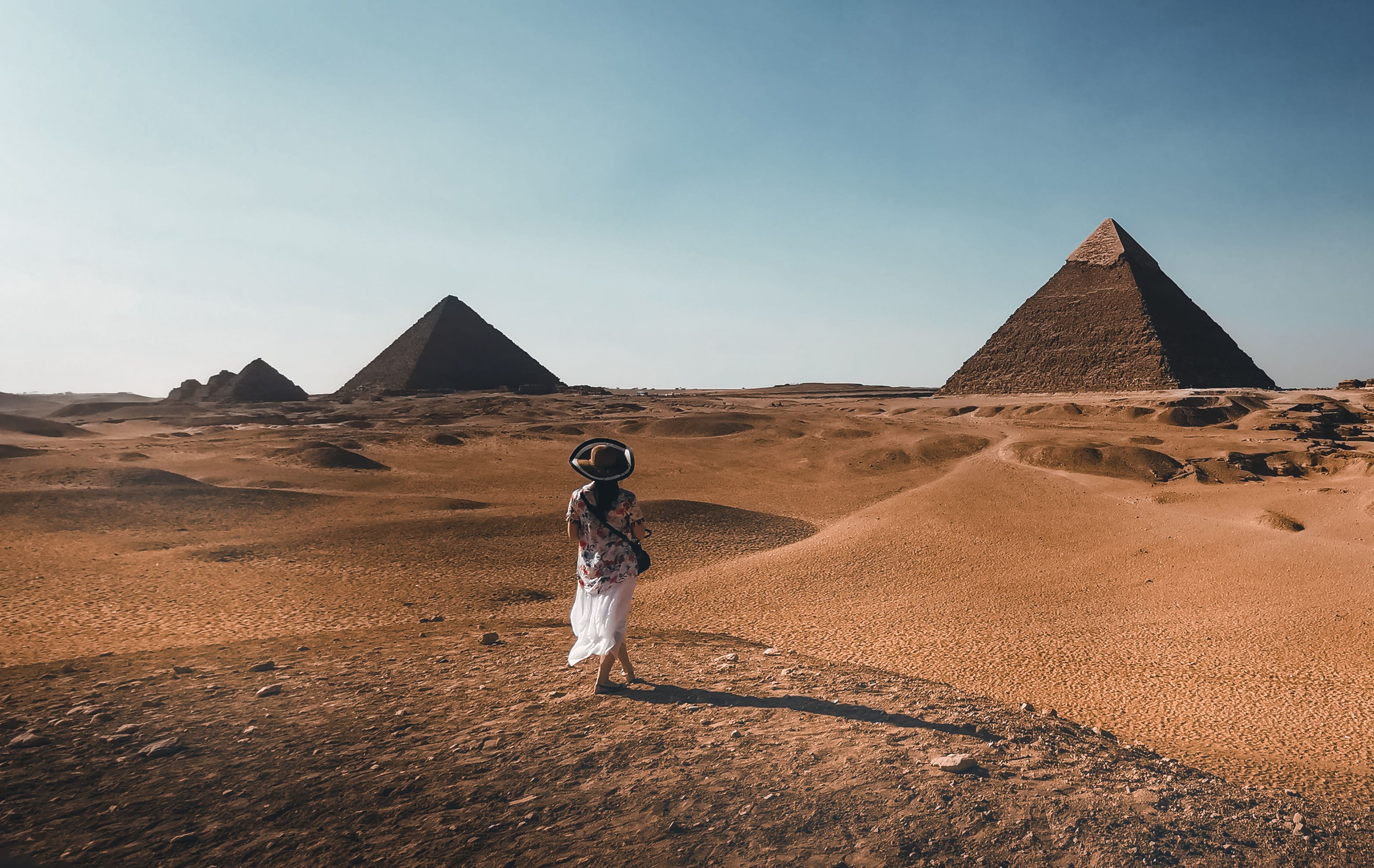 Woman Looking At Pyramids · Free Stock Photo