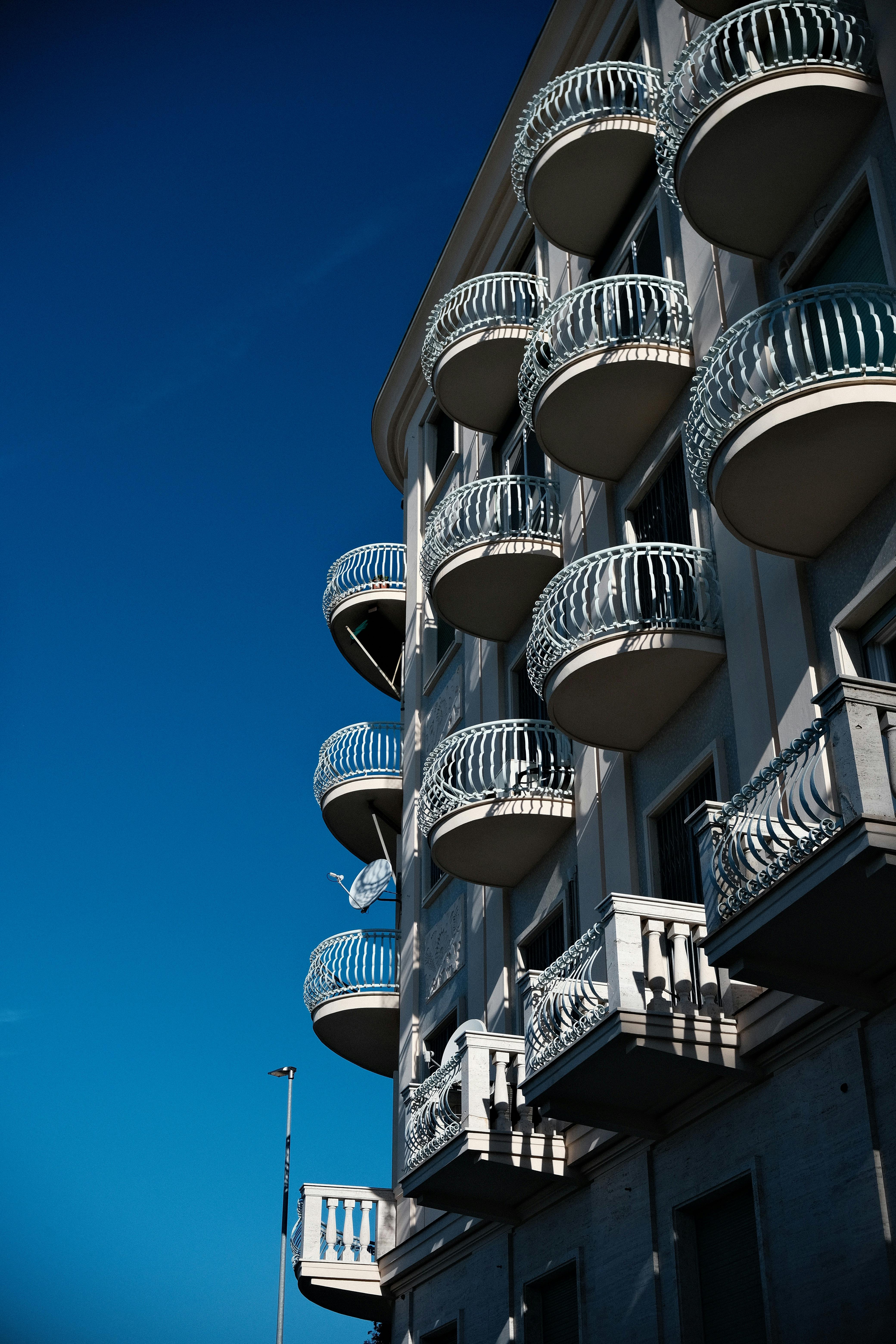 Facade of a Building with Round Balconies · Free Stock Photo