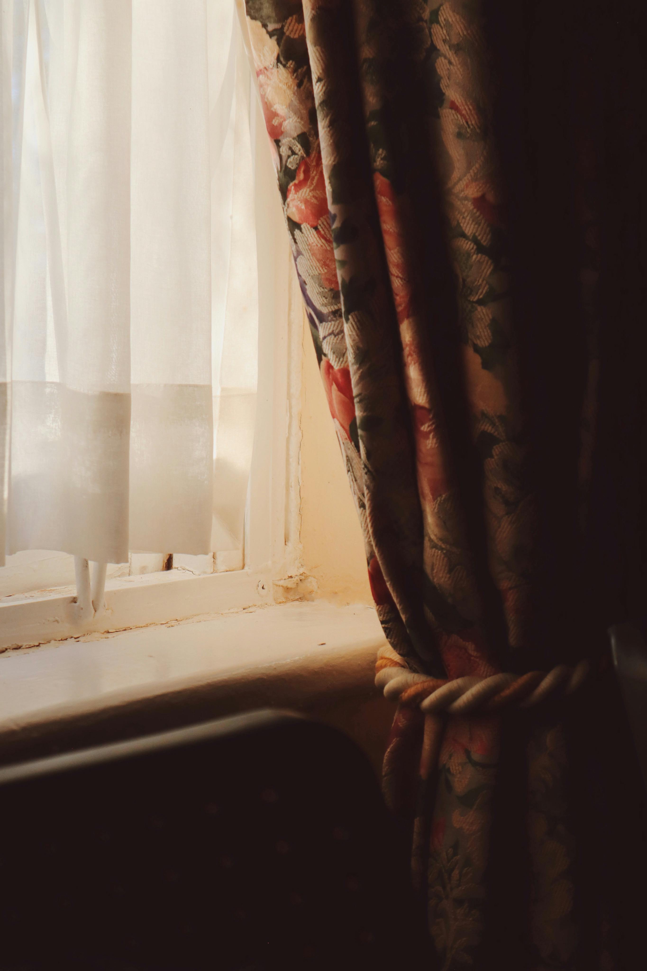 Floral Curtain Tied with a Rope by an Old Wooden Window · Free Stock Photo