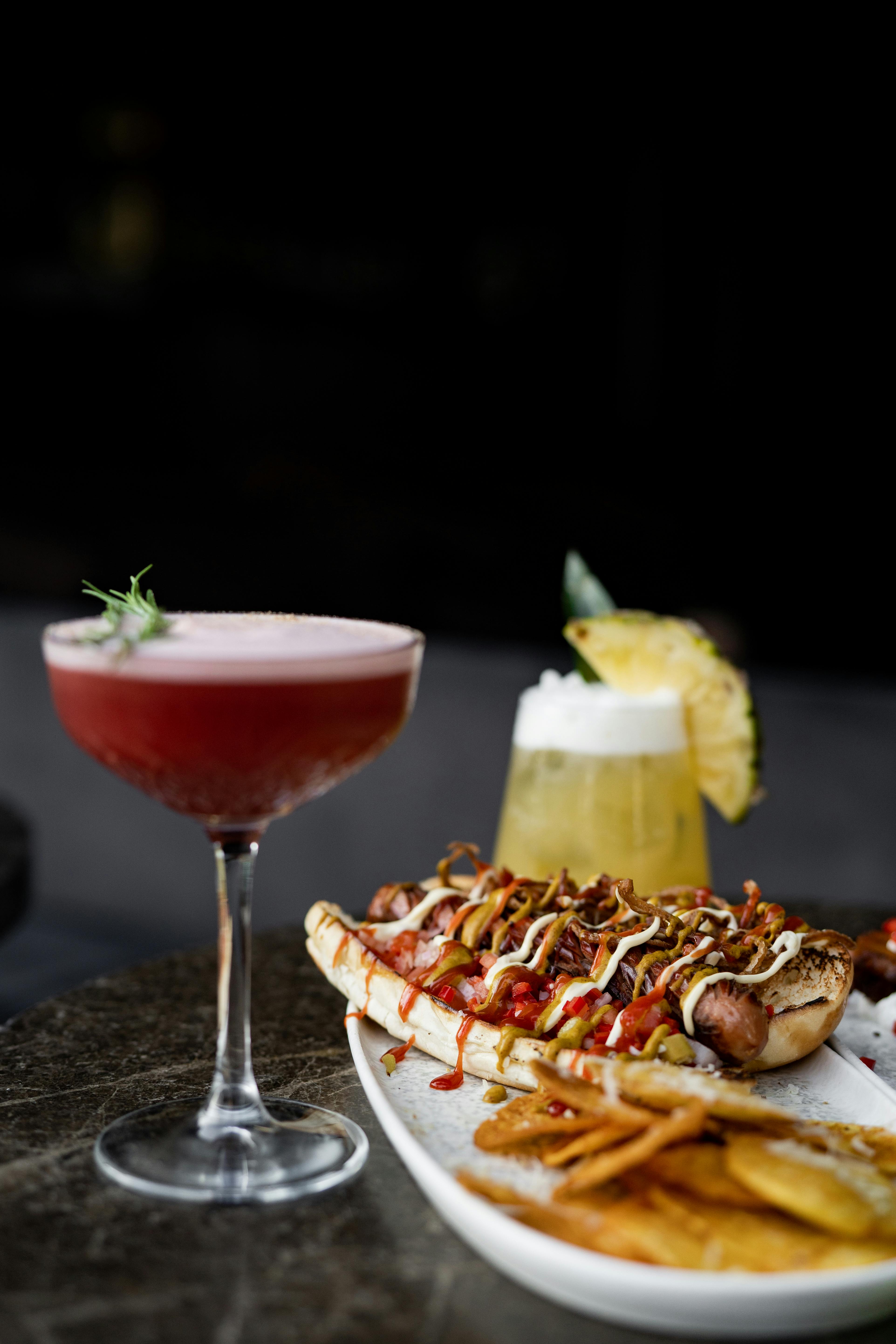 Meal on Plate and Glasses of Cocktails · Free Stock Photo