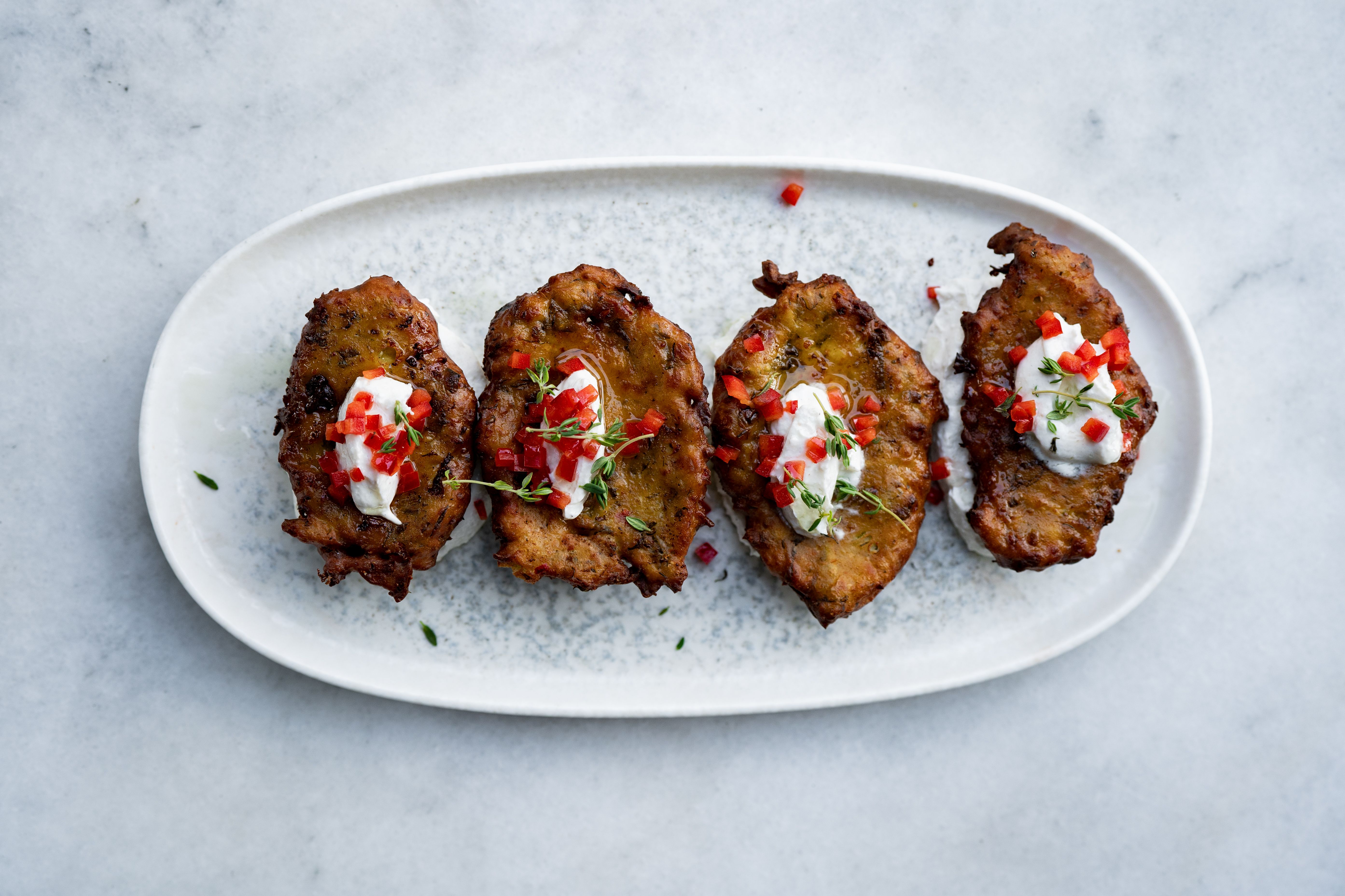 Fried potato with sour cream and chives · Free Stock Photo