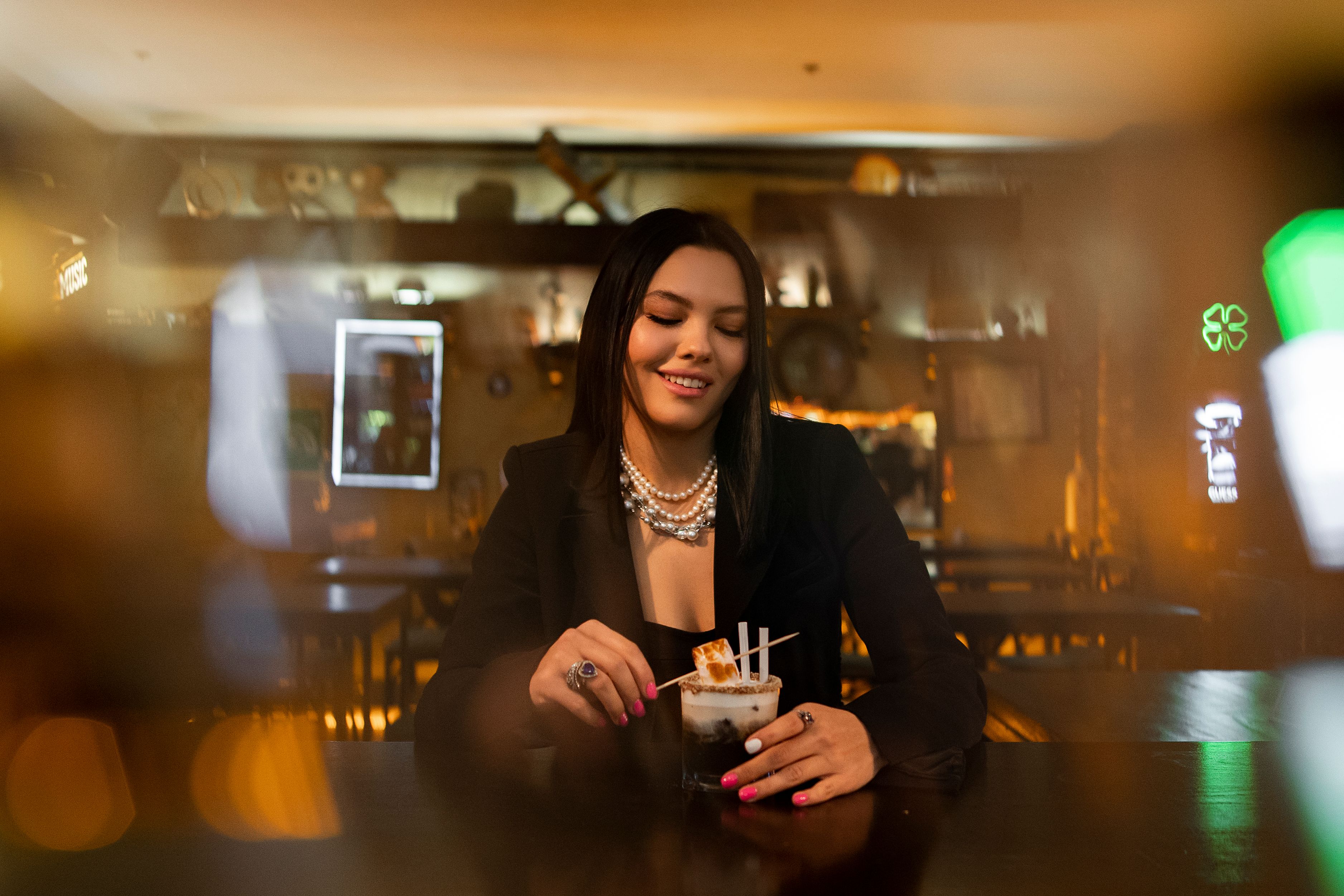 Woman Drinking Cocktail in a Bar · Free Stock Photo