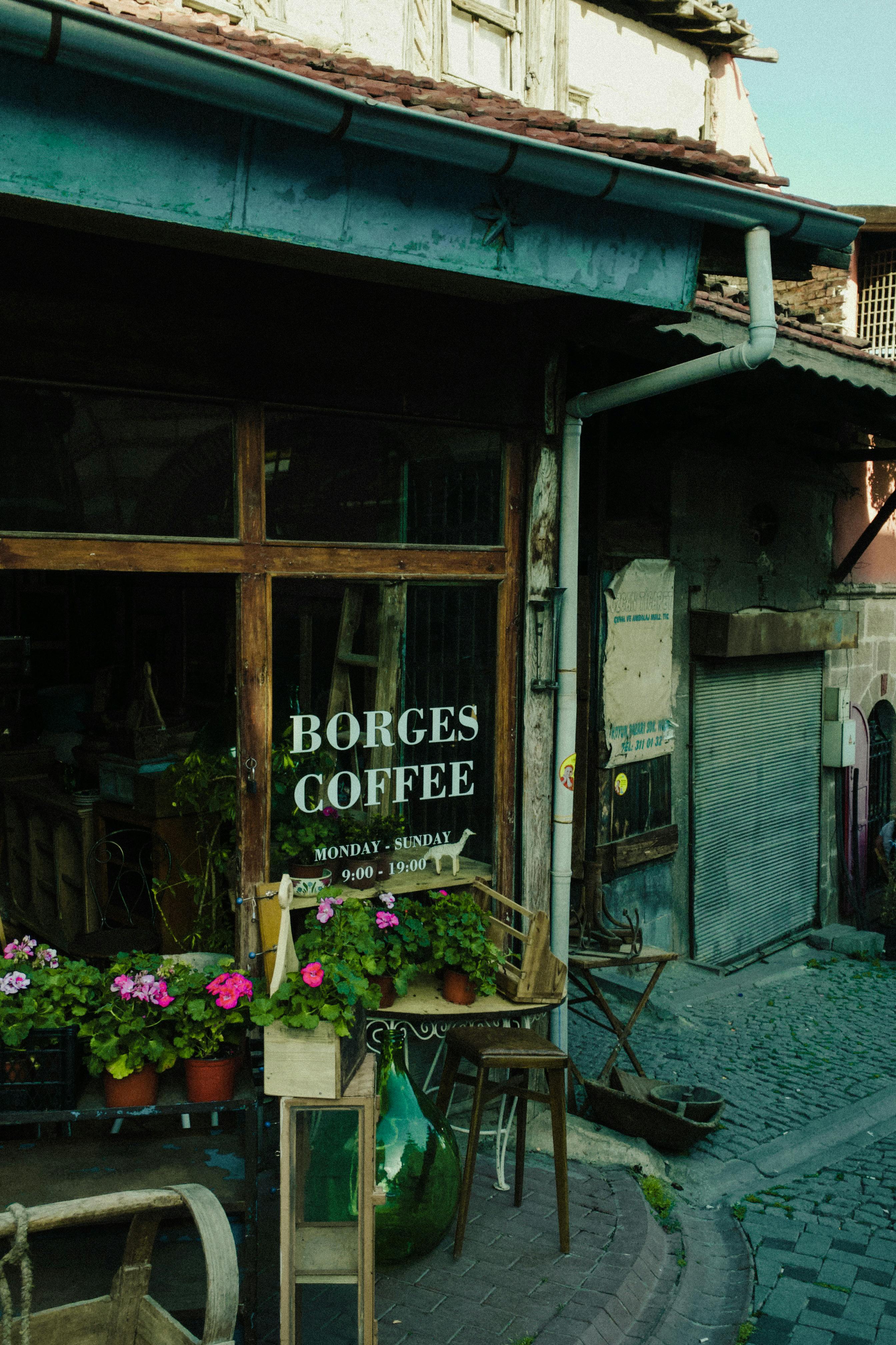 Exterior of historic building with local cafe · Free Stock Photo