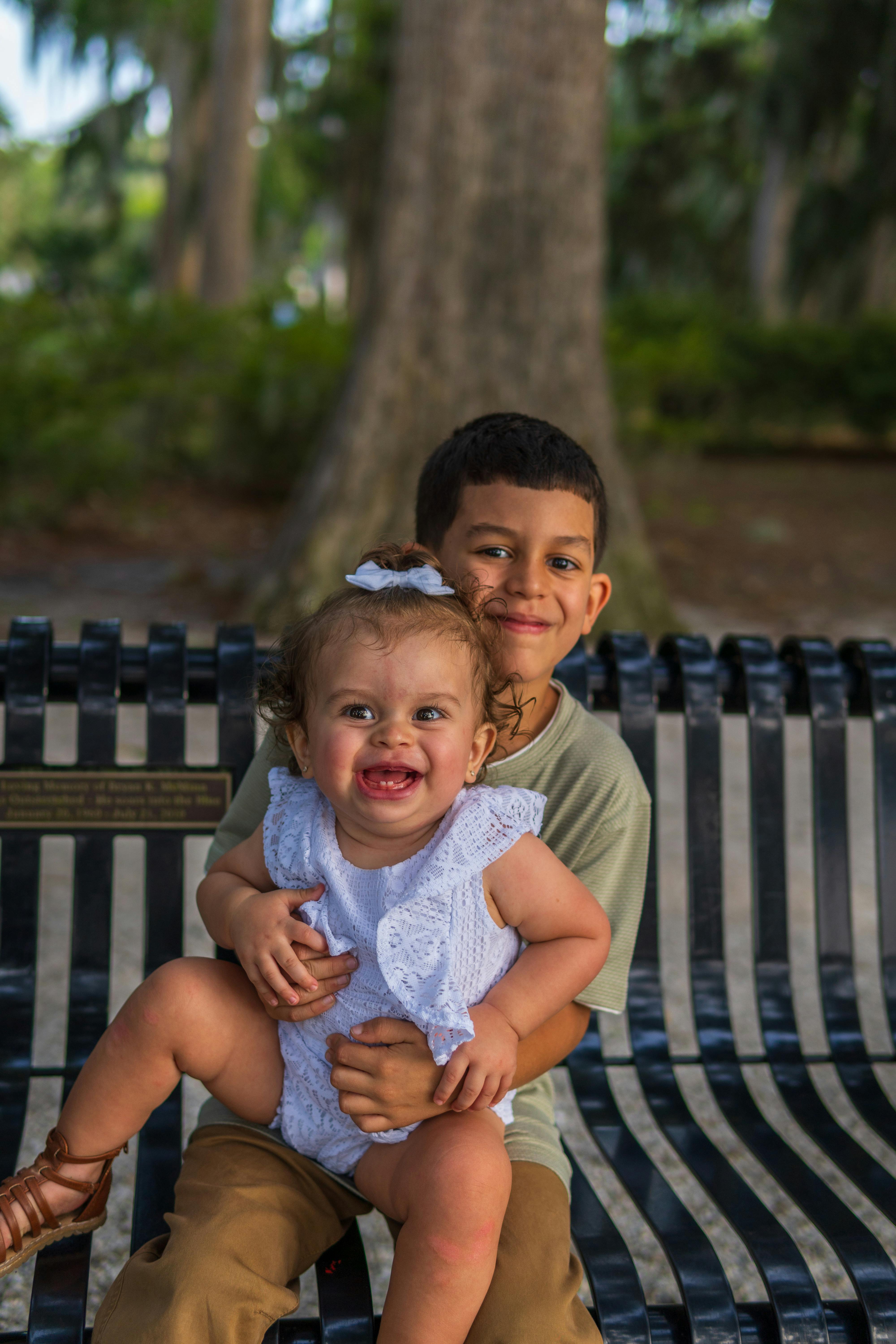 A Portrait of Two Smiling Children · Free Stock Photo