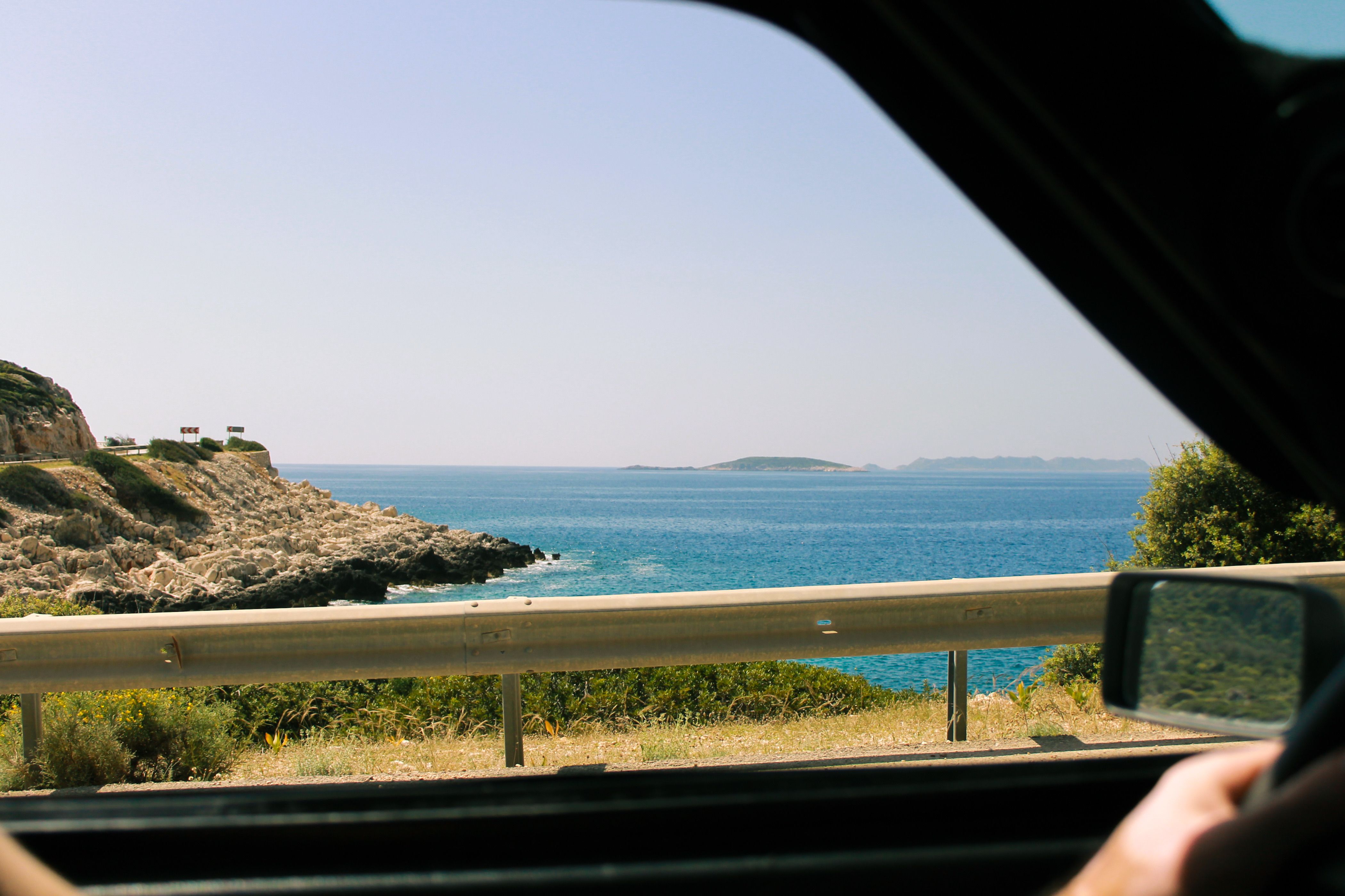 Scenic View of the Coast and the Sea from a Car · Free Stock Photo
