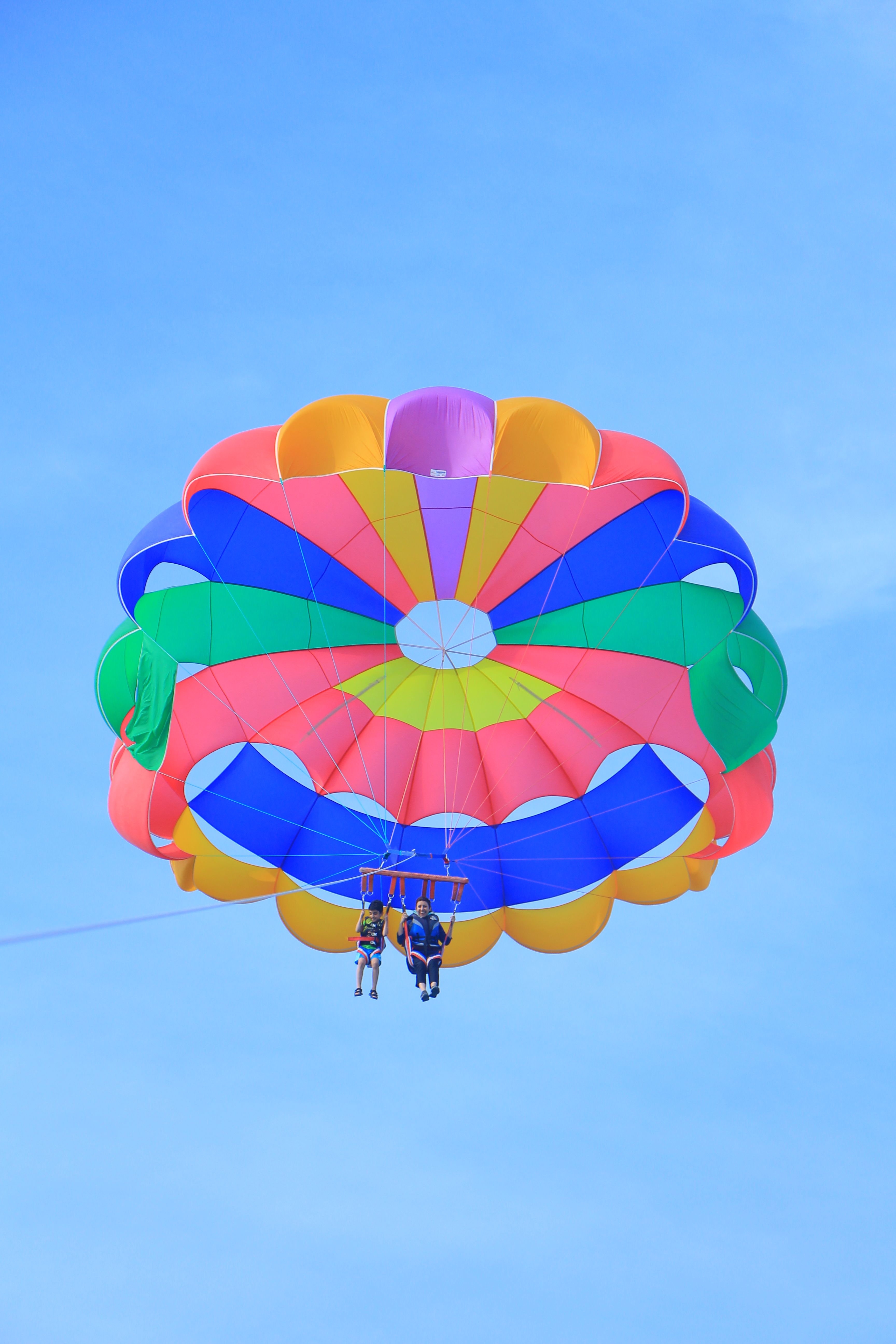 Two People on a Paraglider · Free Stock Photo