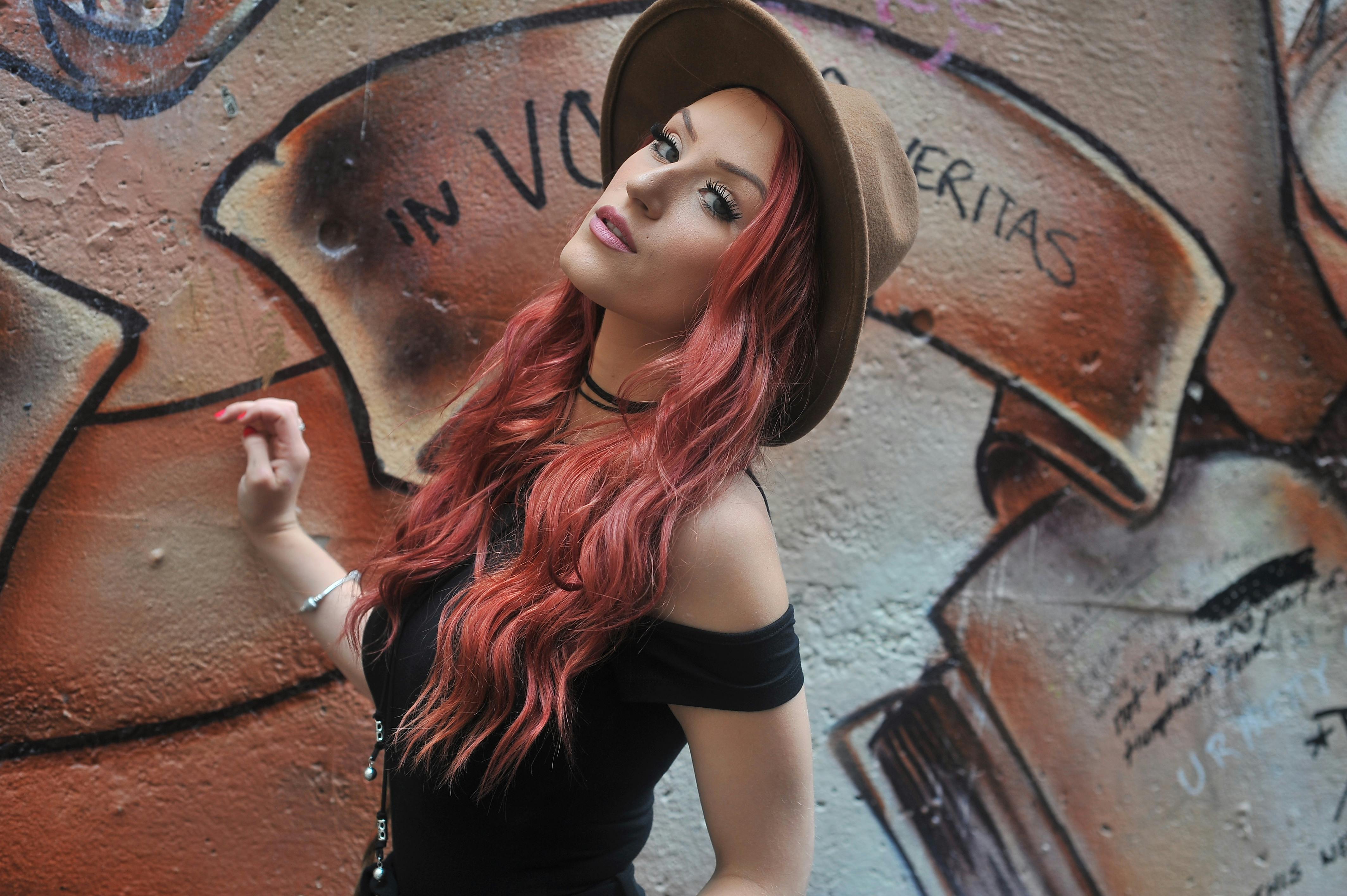 Photo of Woman Wearing Fedora · Free Stock Photo