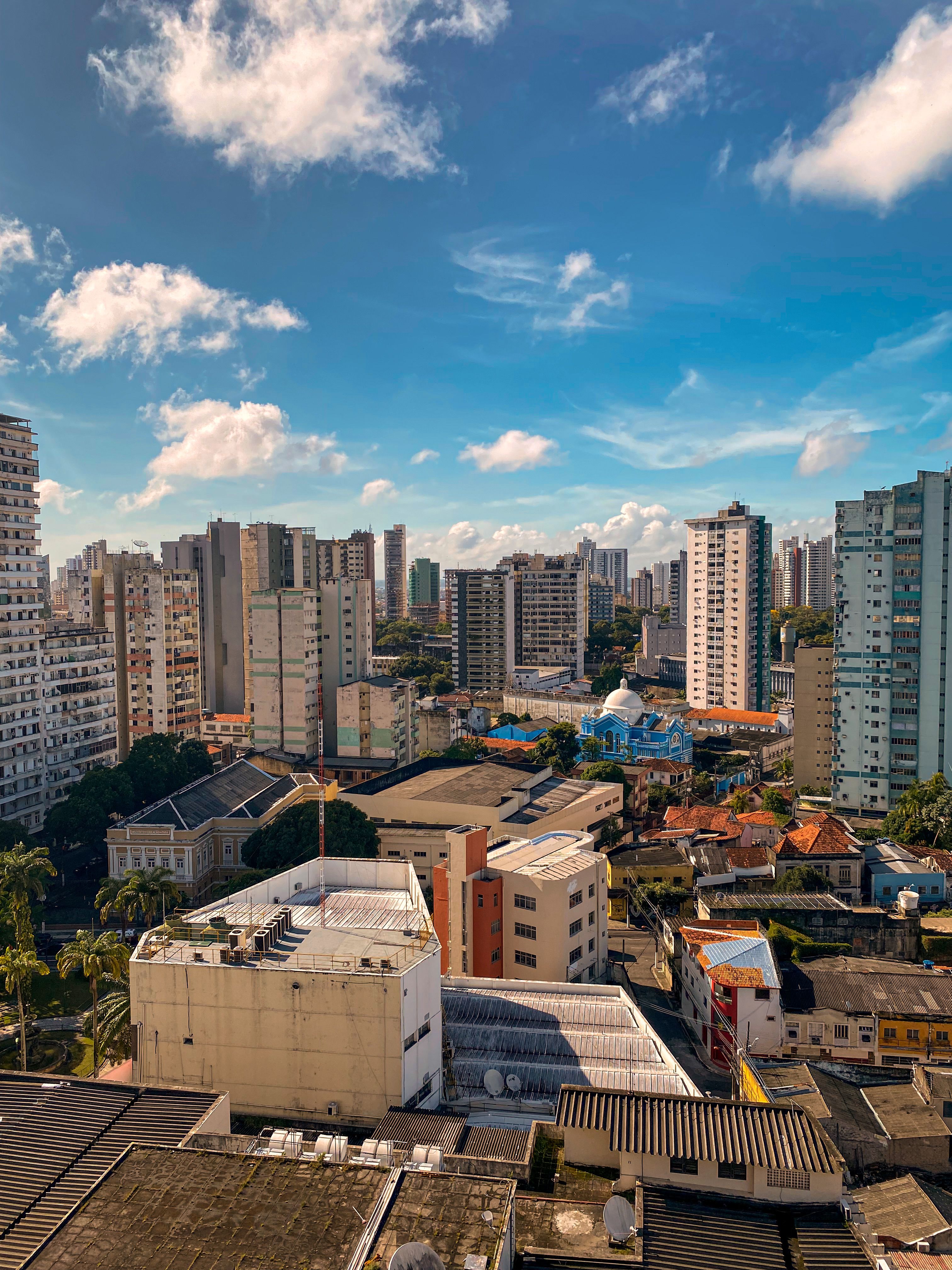 Small City District Surrounded by Tall Apartment Buildings · Free Stock ...