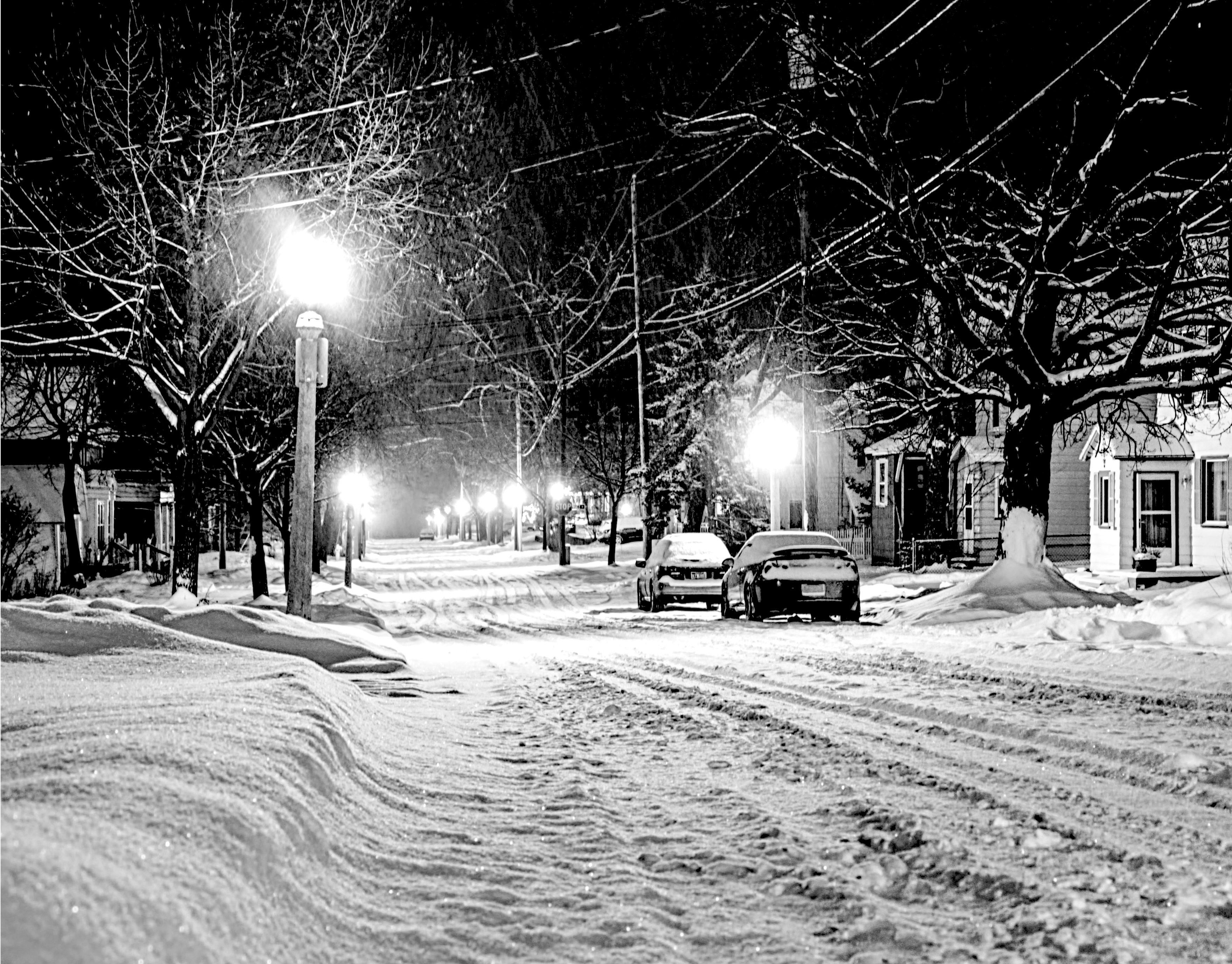 Illuminated Street Light on Snow Covered City · Free Stock Photo