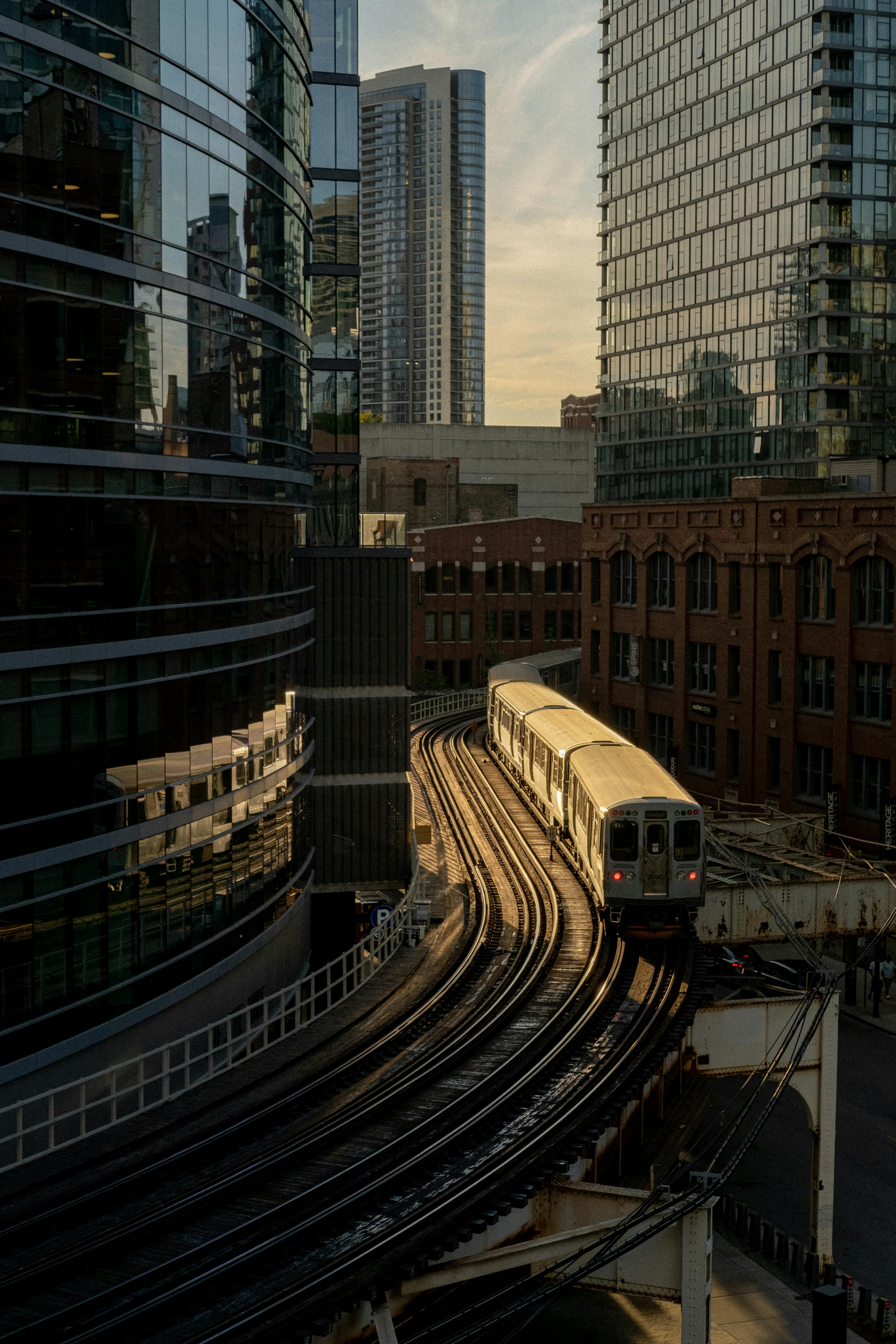 View of a Train between Modern Skyscrapers in Downtown Chicago ...