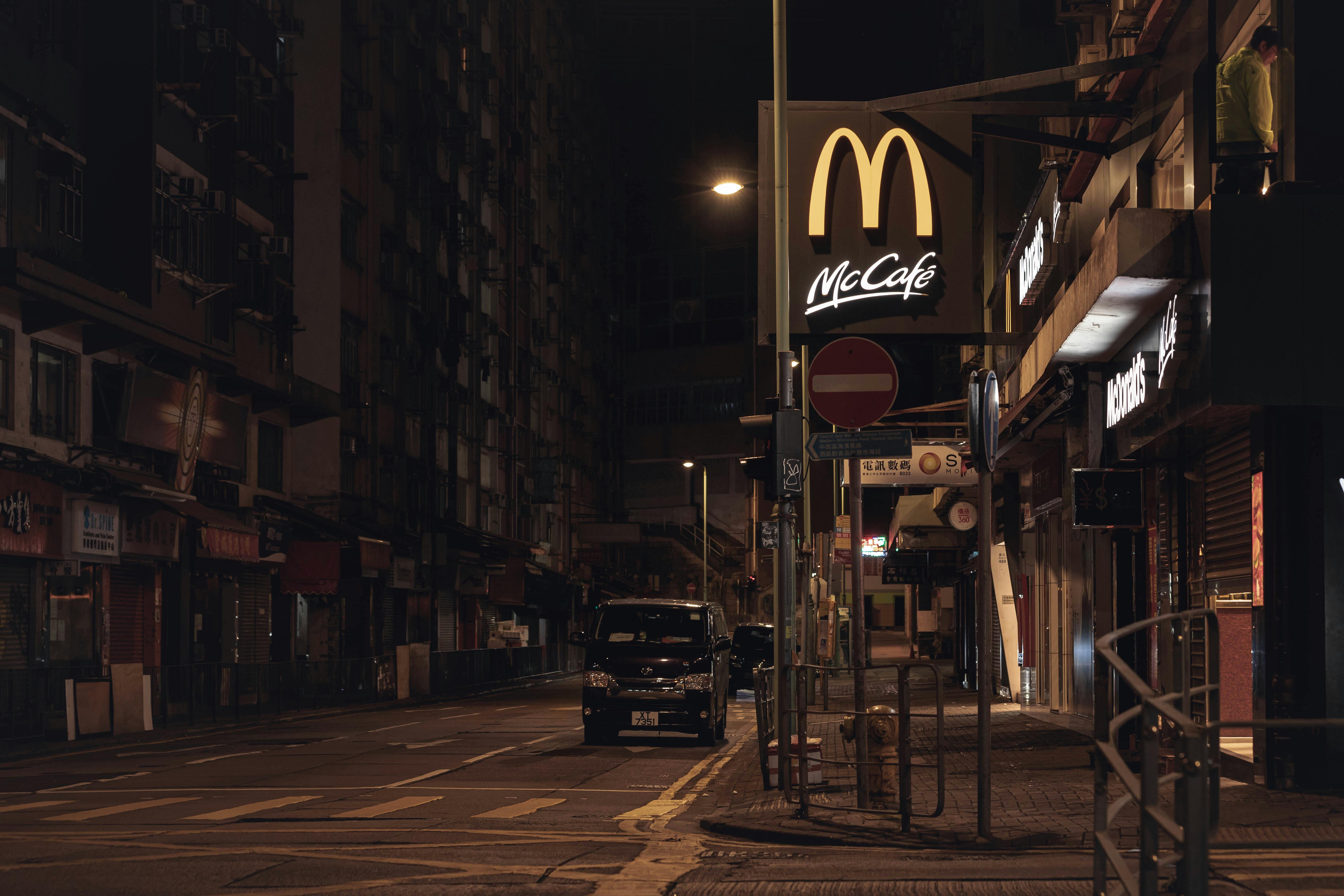 Fast Food Restaurant by the Street of a City at Night · Free Stock Photo