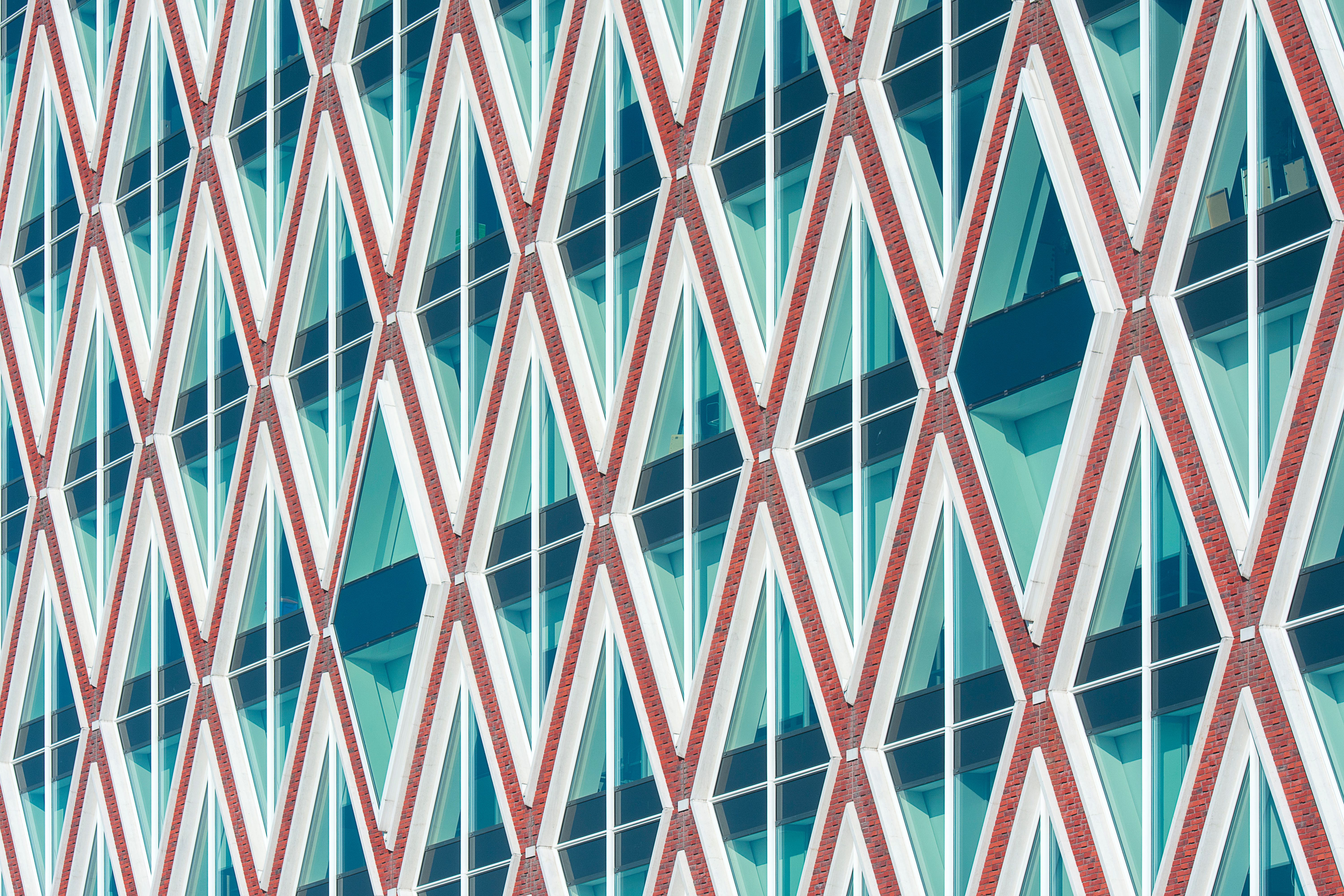 Glass Wall of Modern Building with Diagonal Brick Pattern · Free Stock ...