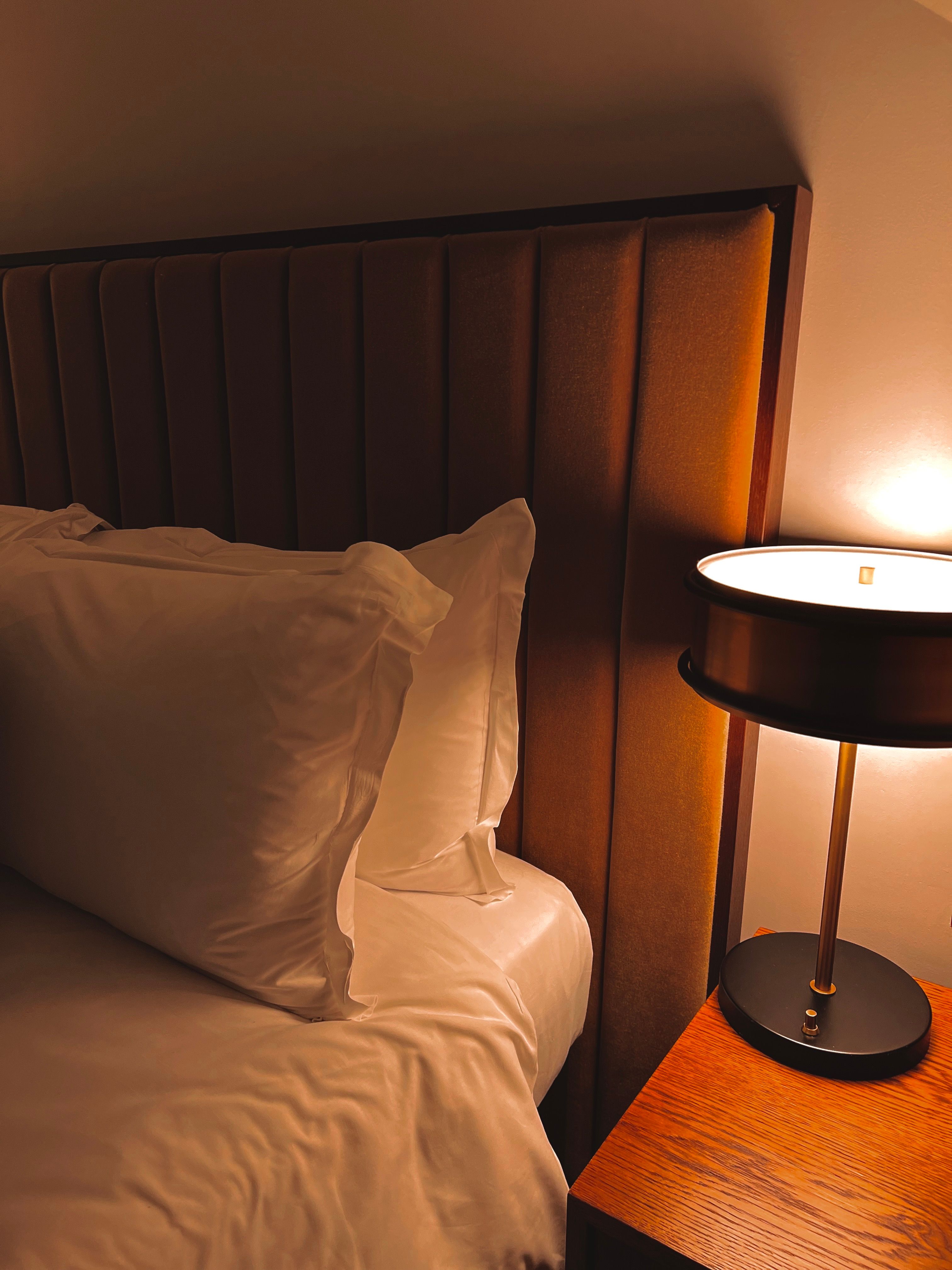 Lamp on Night Stand near Bed · Free Stock Photo