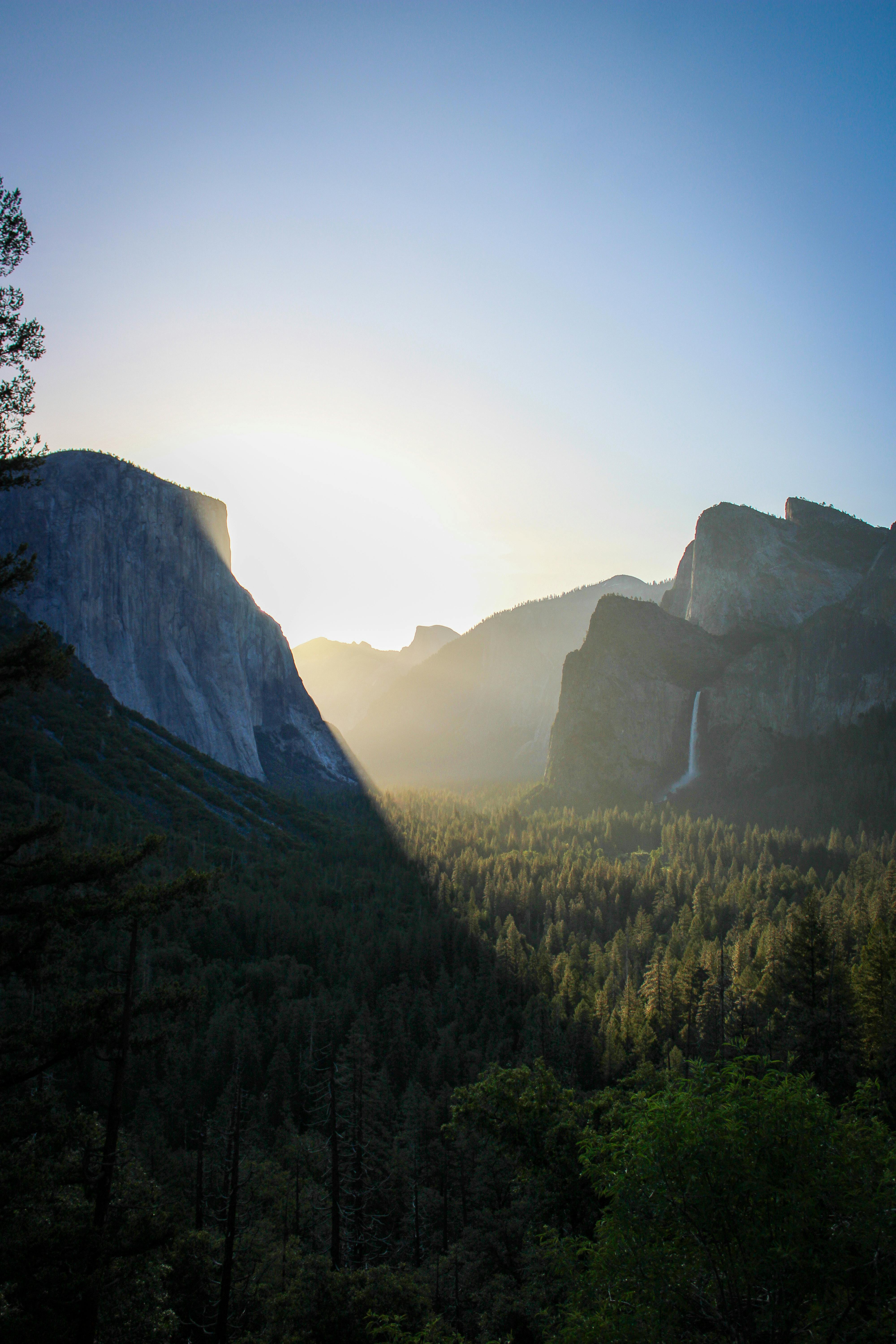 Sunset Over the Valley Among the Steep Mountains · Free Stock Photo