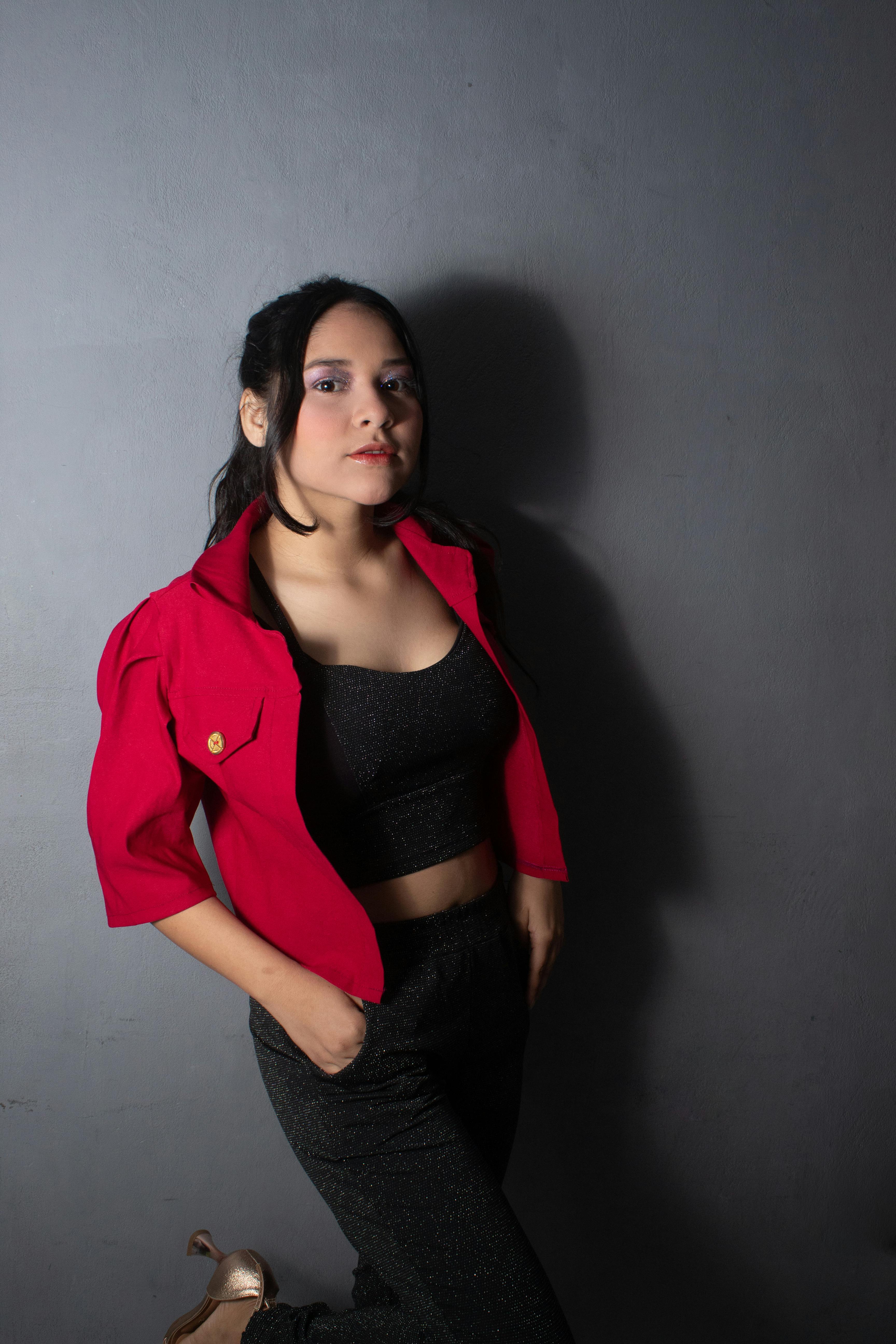 Portrait of a Woman in a Red Jacket · Free Stock Photo