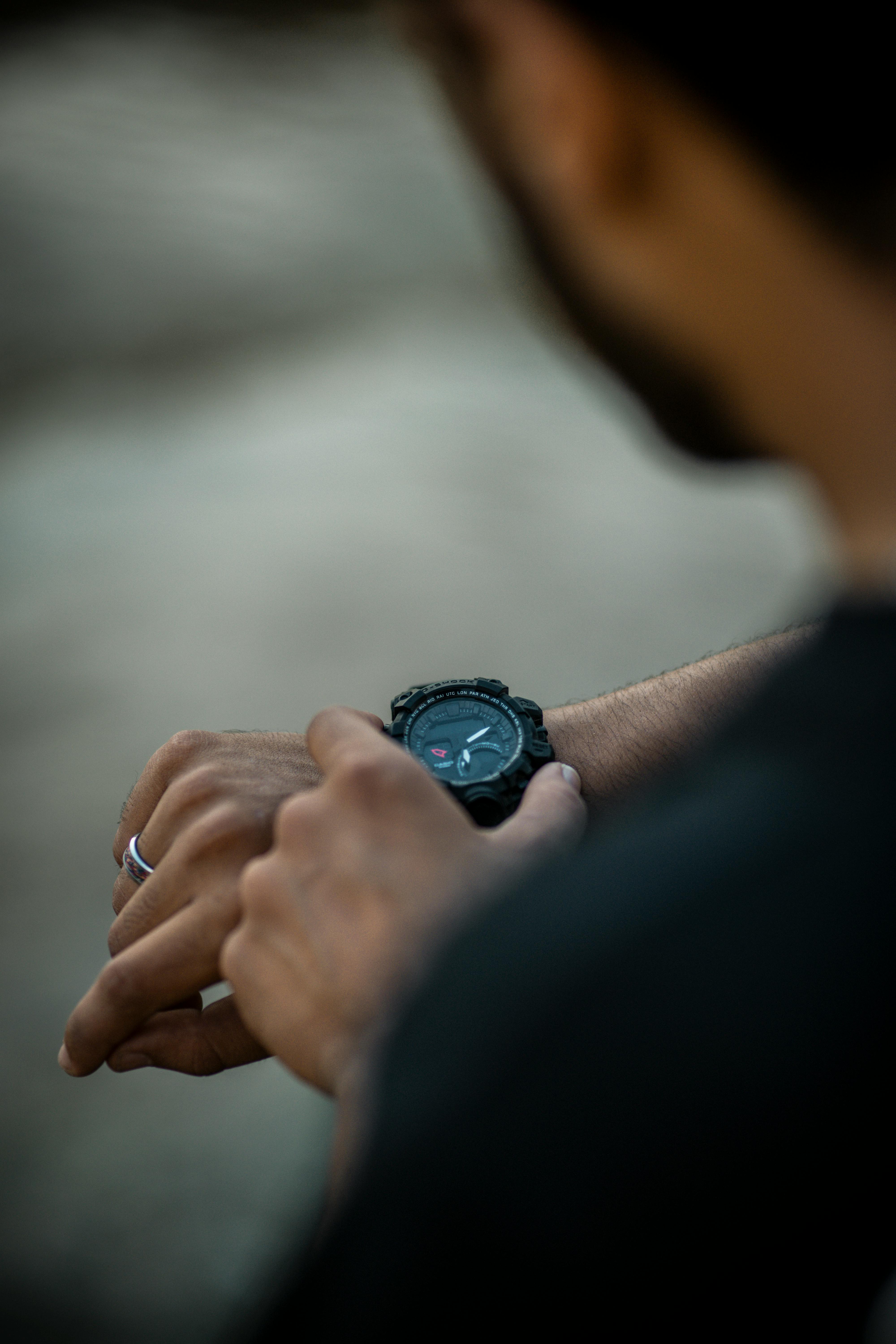 Person Wearing Black Analog Watch · Free Stock Photo
