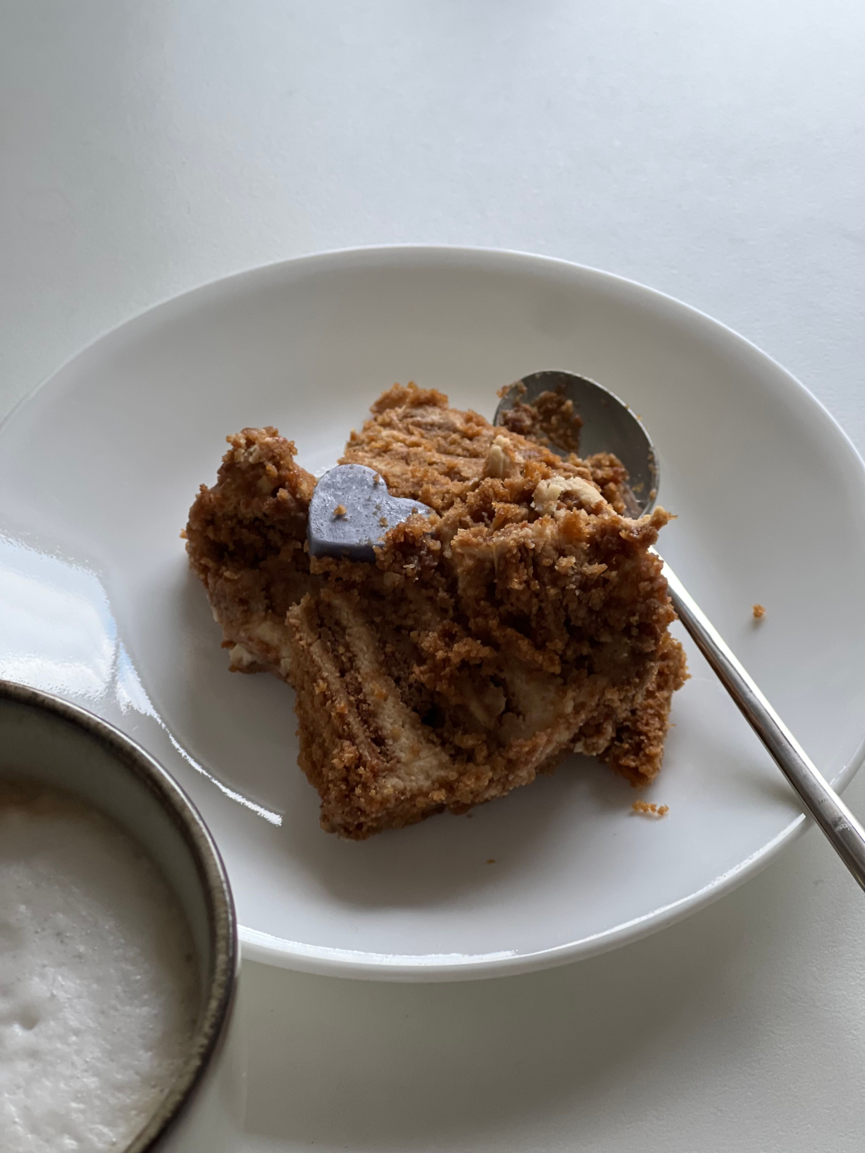 Close-up of a Cup of Coffee and Dessert on a Plate · Free Stock Photo