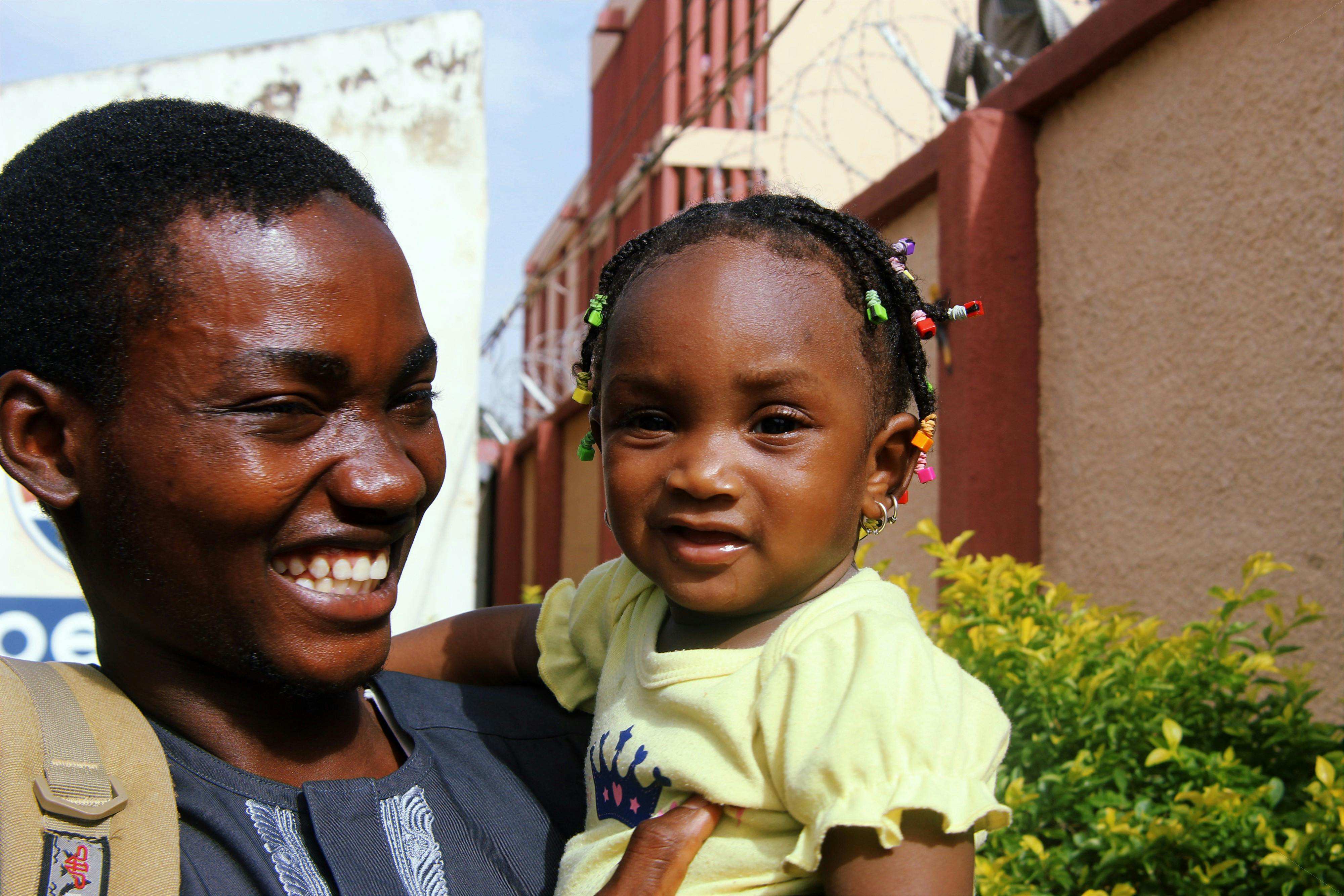 Man Carrying Boy On Shoulders · Free Stock Photo