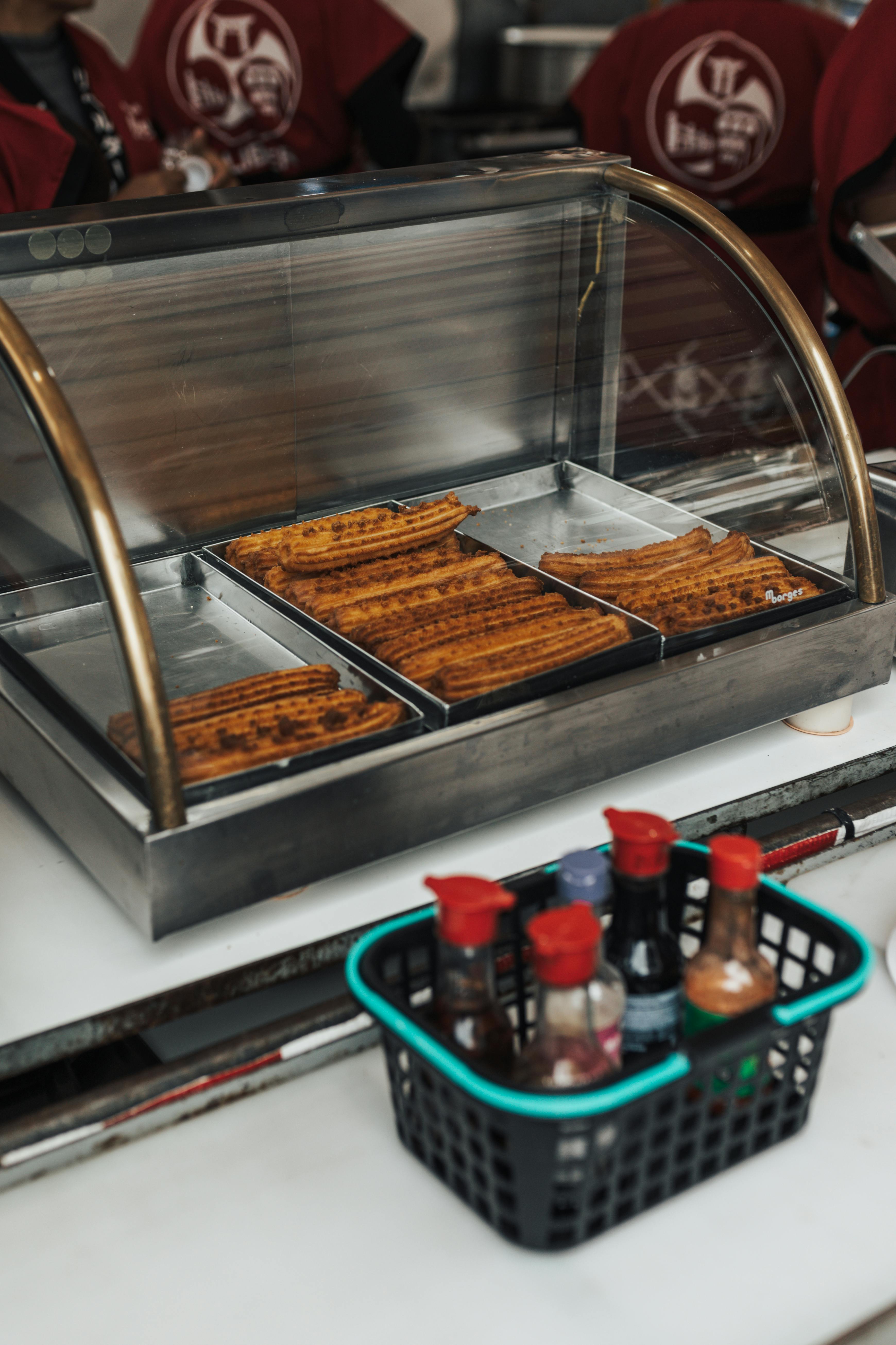 Display Case in a Cafe with Sweet Churros · Free Stock Photo