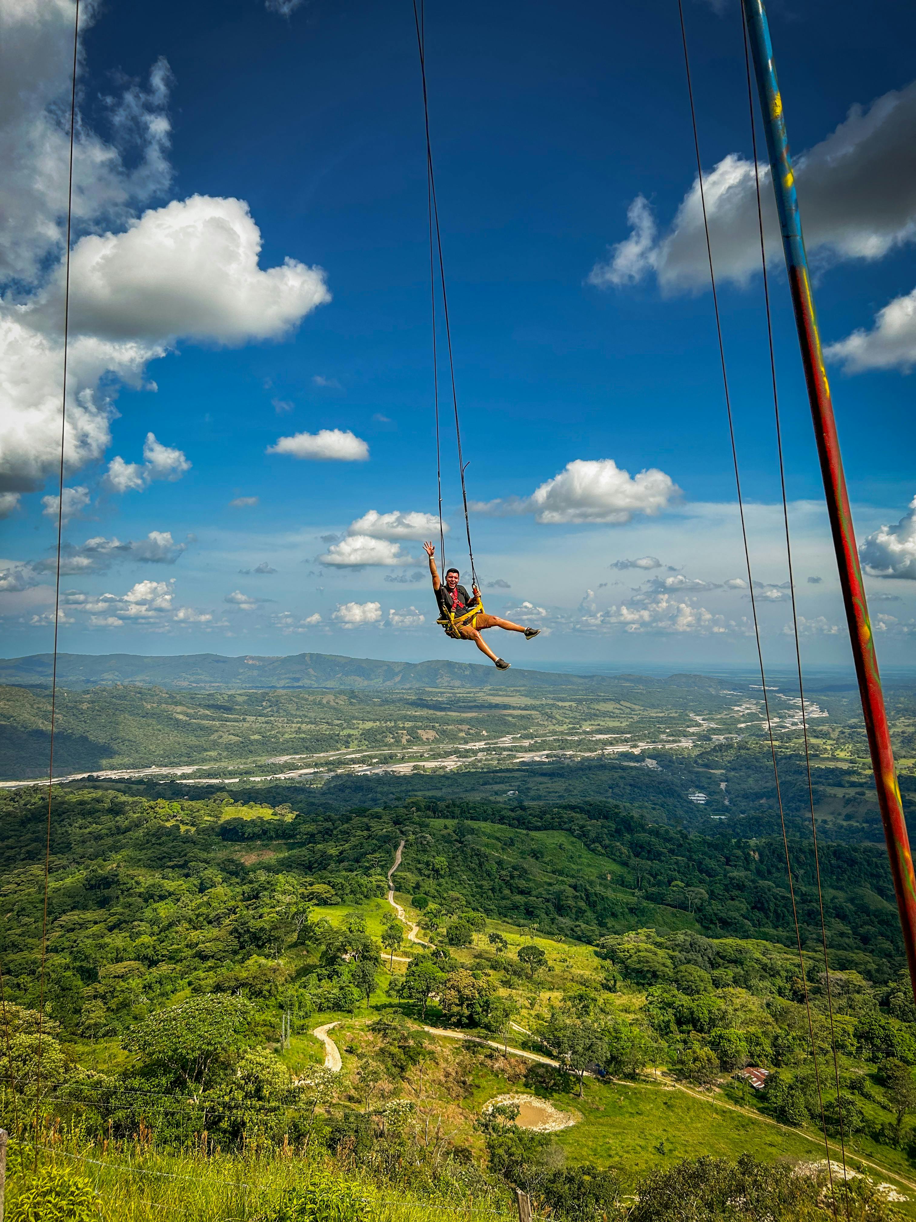 Man Bungee Jumping in Countryside · Free Stock Photo