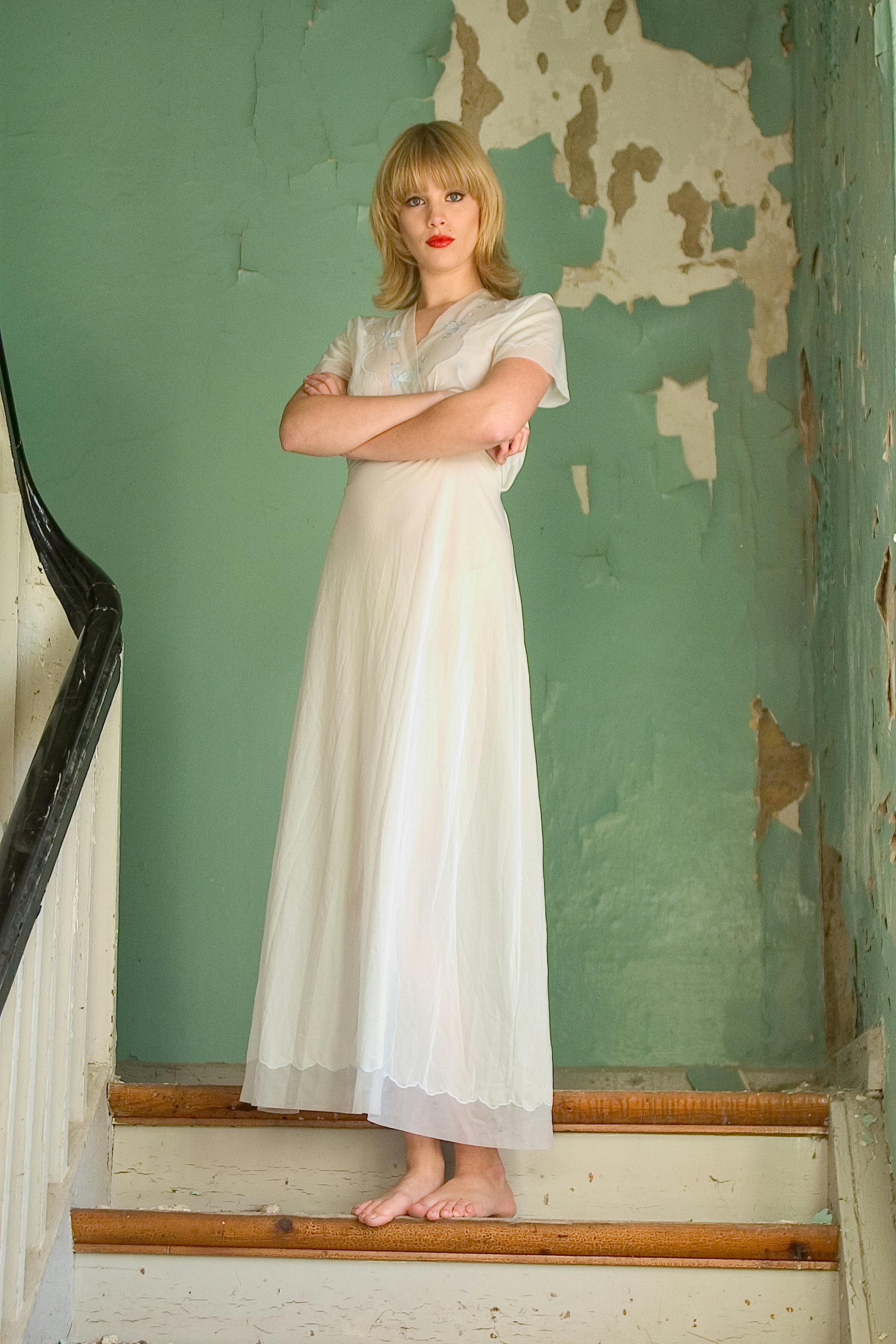 Woman In Red And Black Dress Posing For A Photo · Free Stock Photo