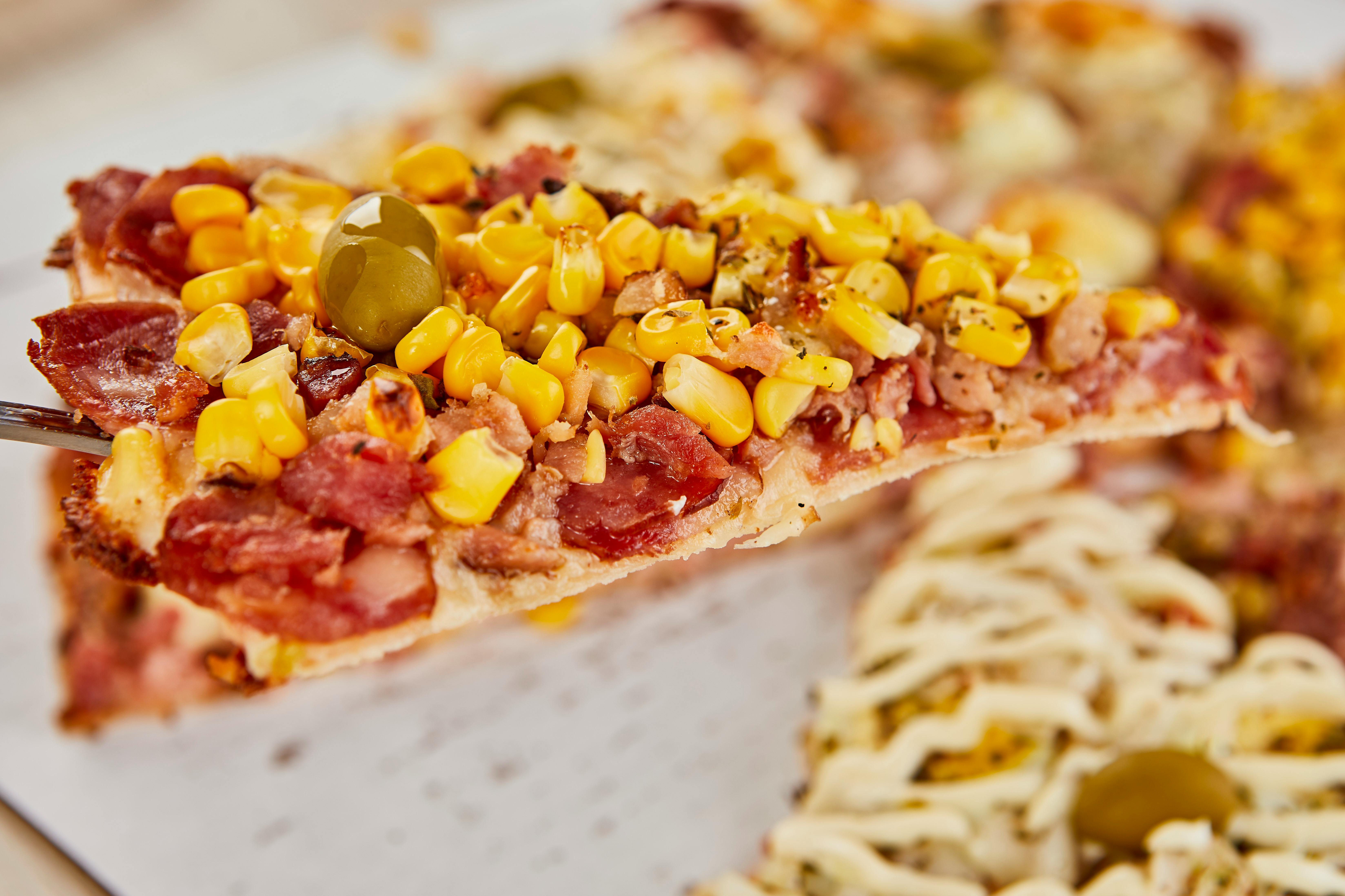 Green-haired Woman Eating Pizza · Free Stock Photo