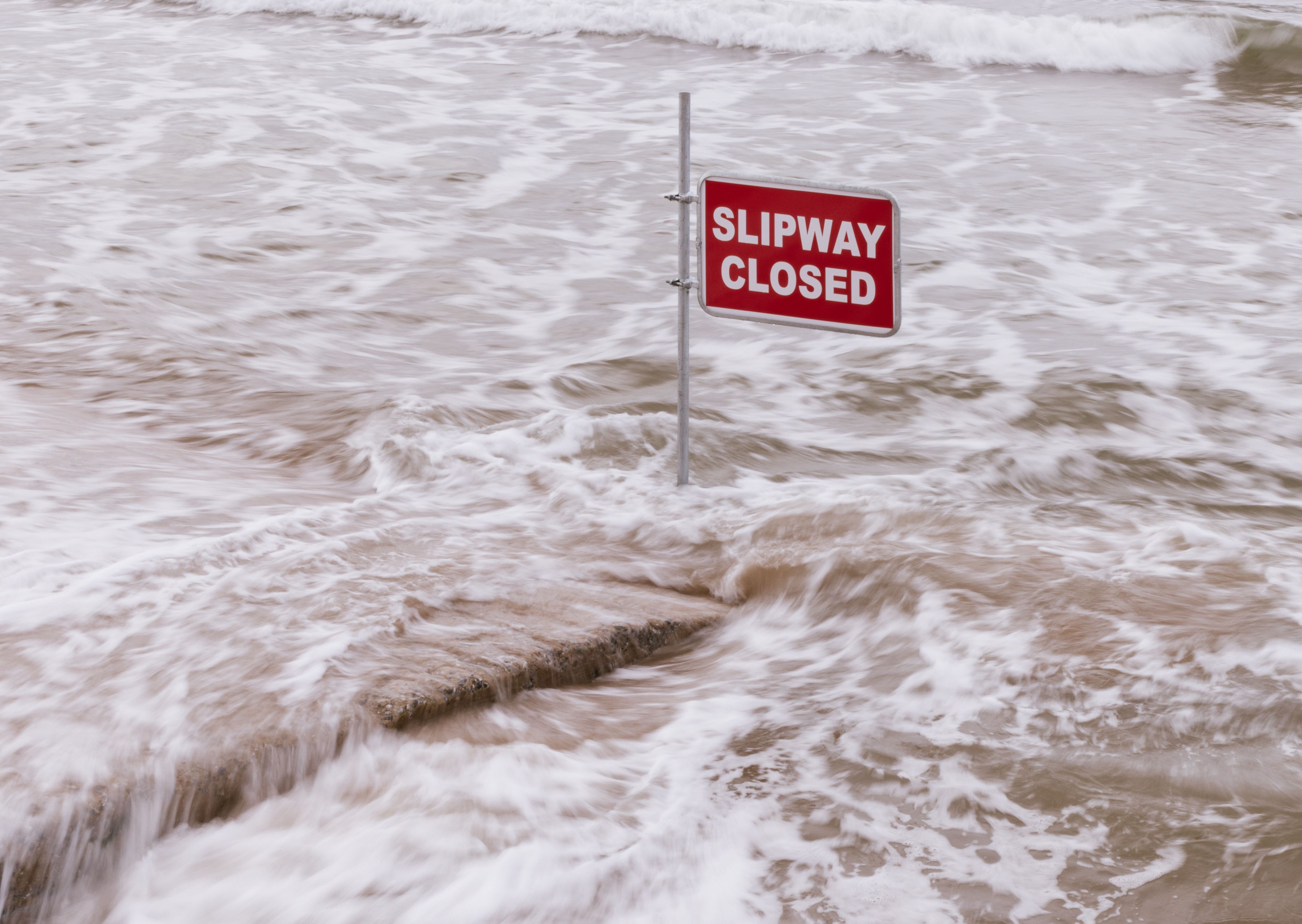 Sign by the Stream of Water · Free Stock Photo