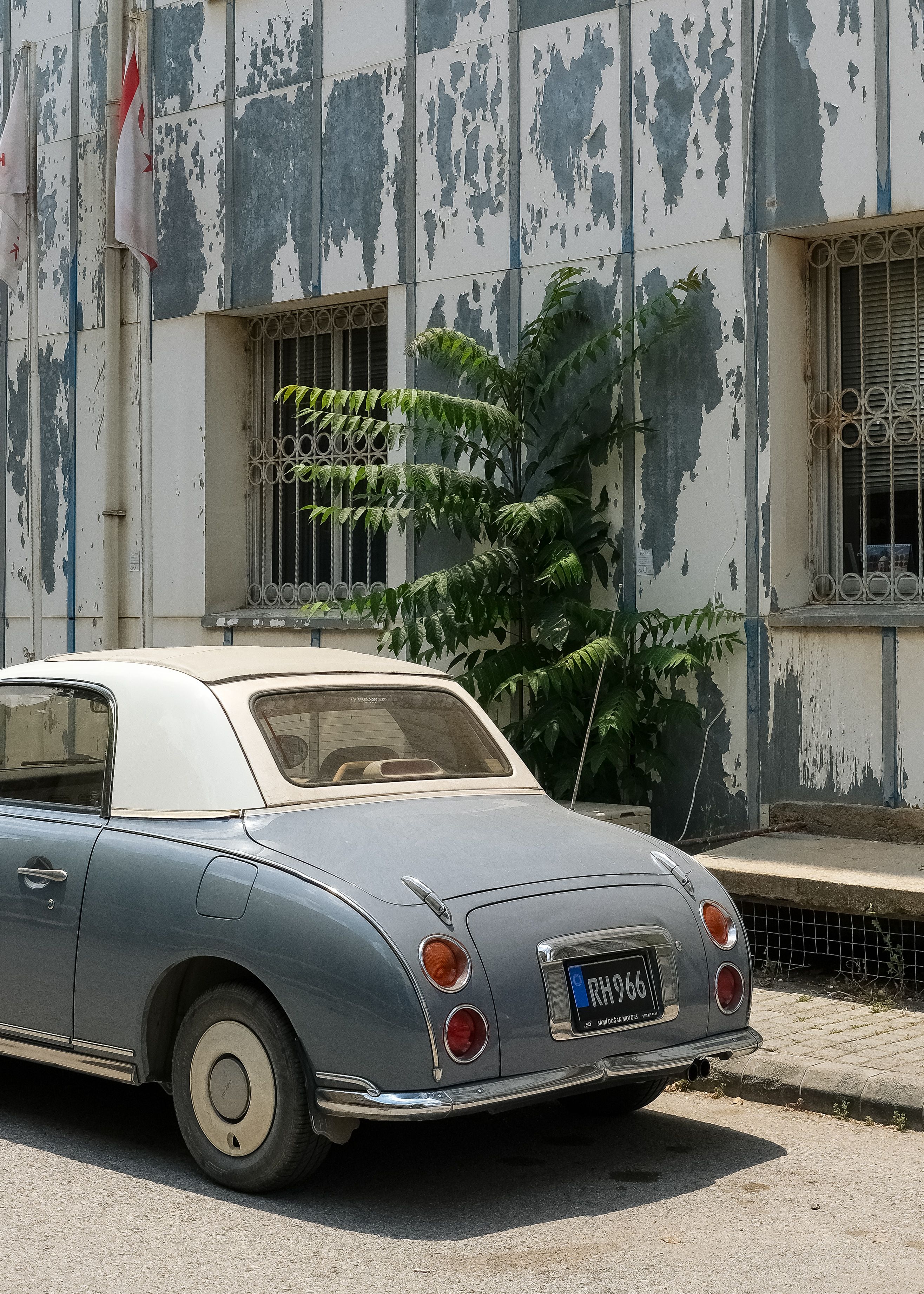 Nissan Figaro Parked on Street · Free Stock Photo