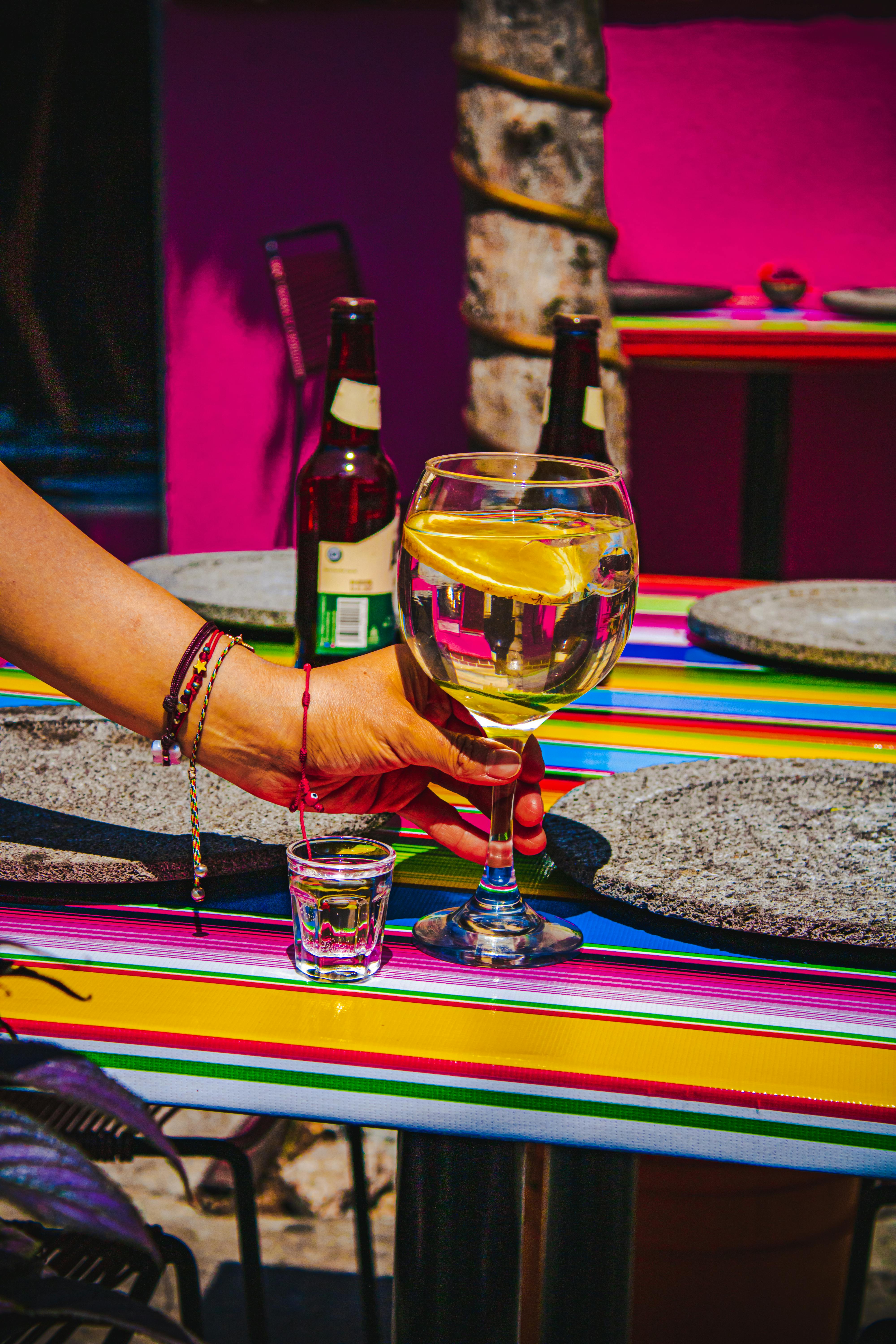 Person Holding Glass of Drink · Free Stock Photo