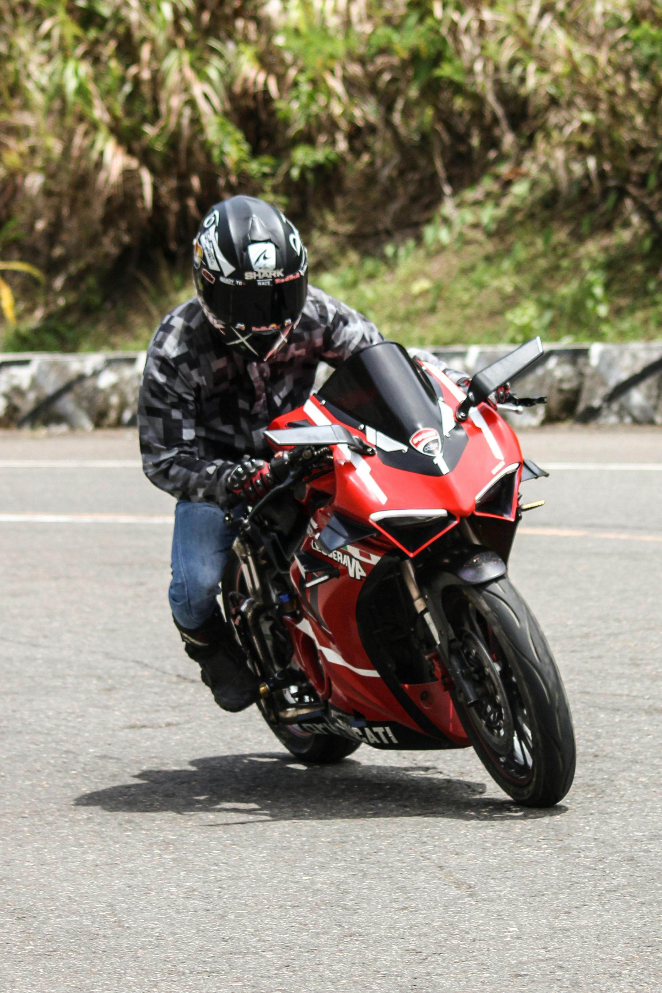 Man Riding Motorcycle on Road · Free Stock Photo