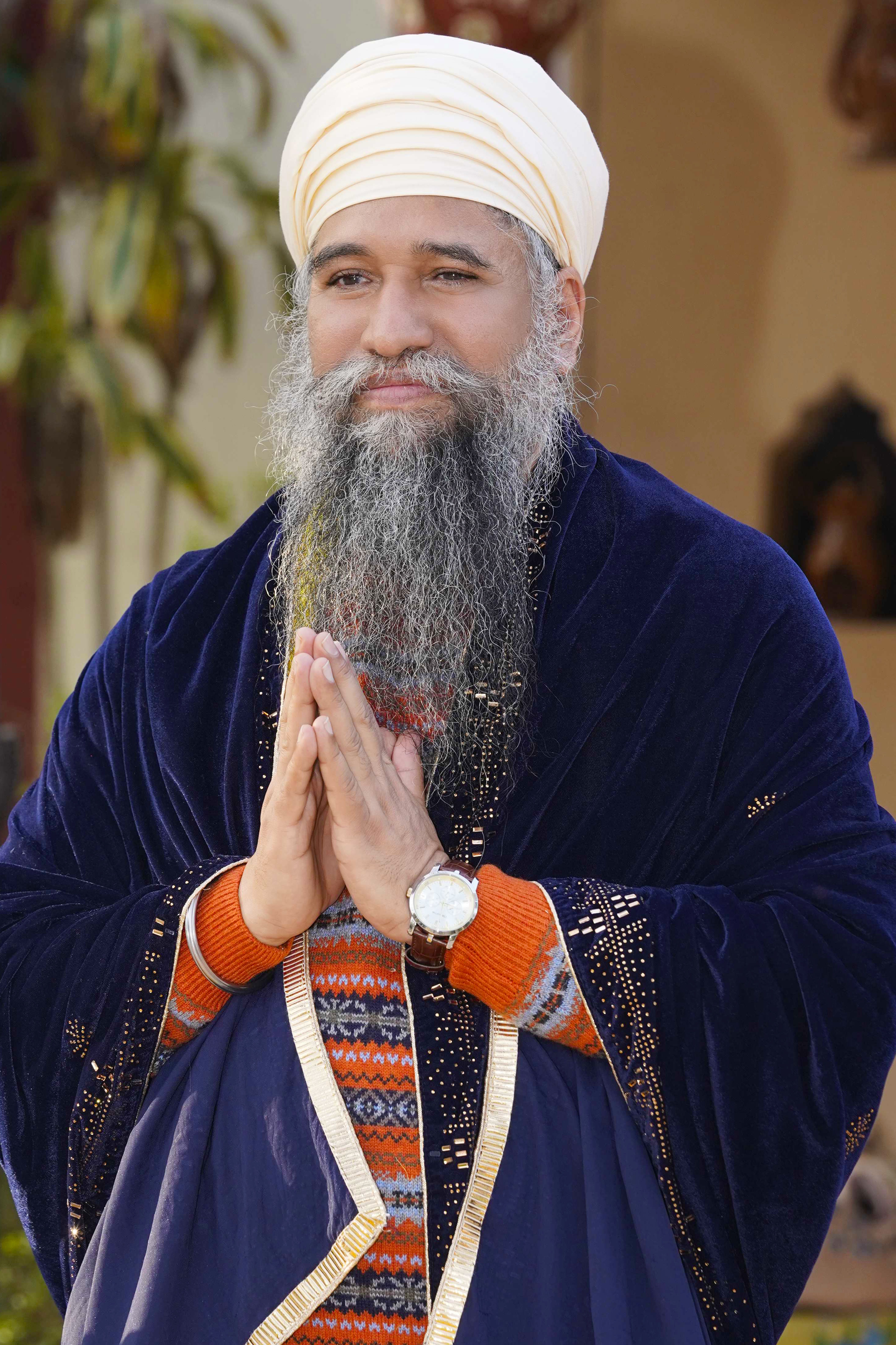 Portrait of Man Praying in Traditional Clothing · Free Stock Photo