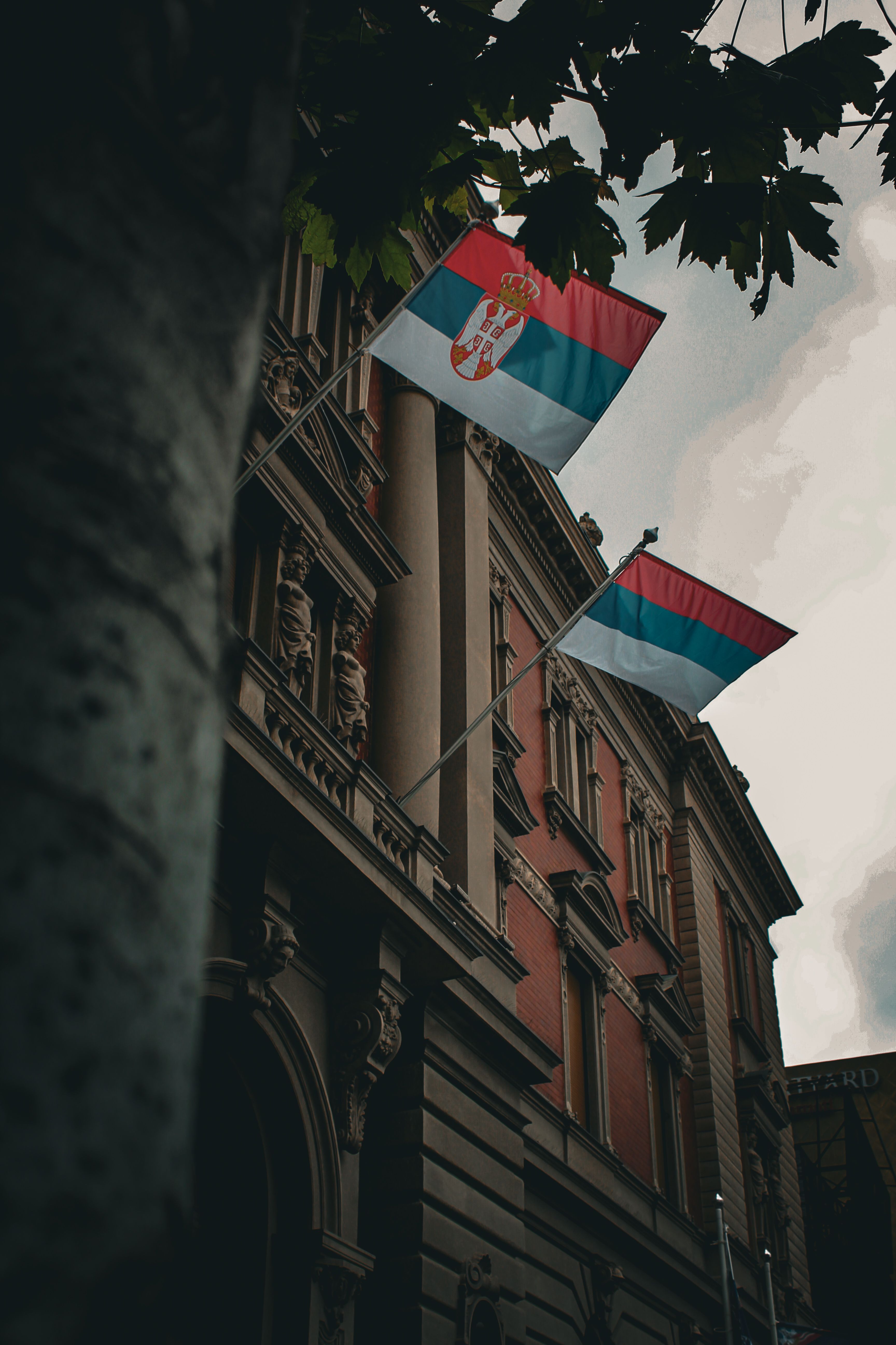 Serbian Flags at Building · Free Stock Photo