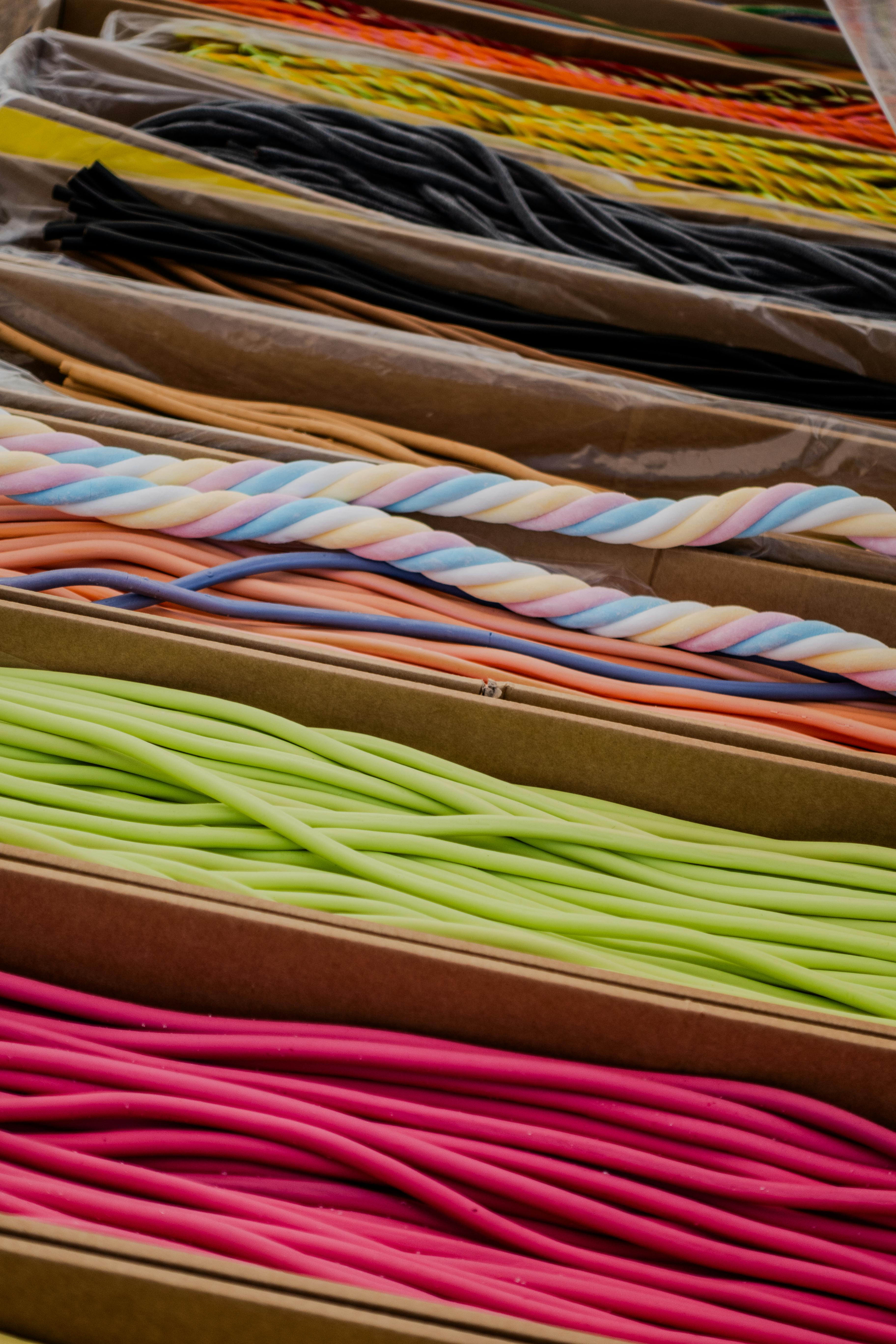 String Candy Laid Out in Containers · Free Stock Photo