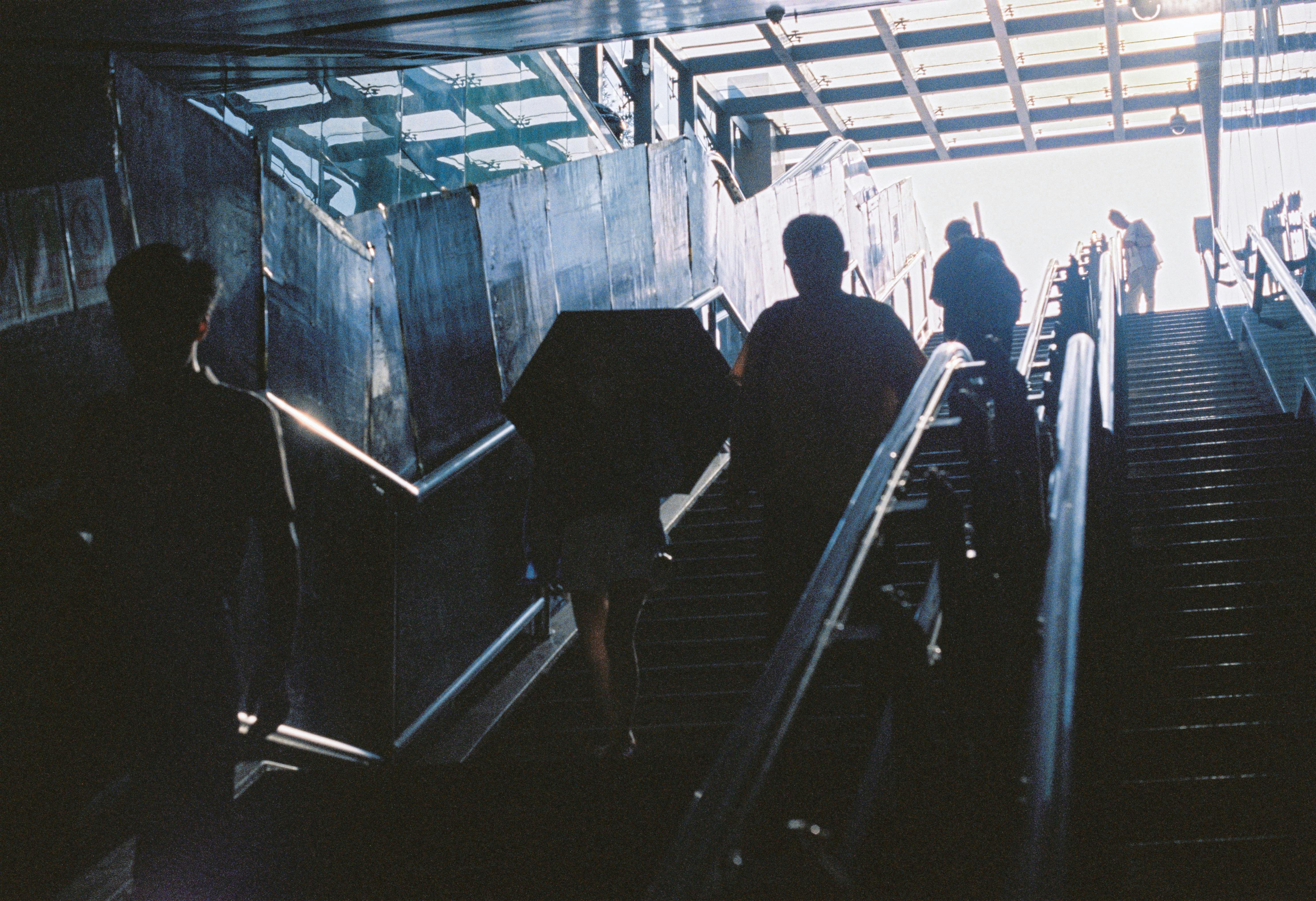 Dark Moving Stair Escalator with People · Free Stock Photo