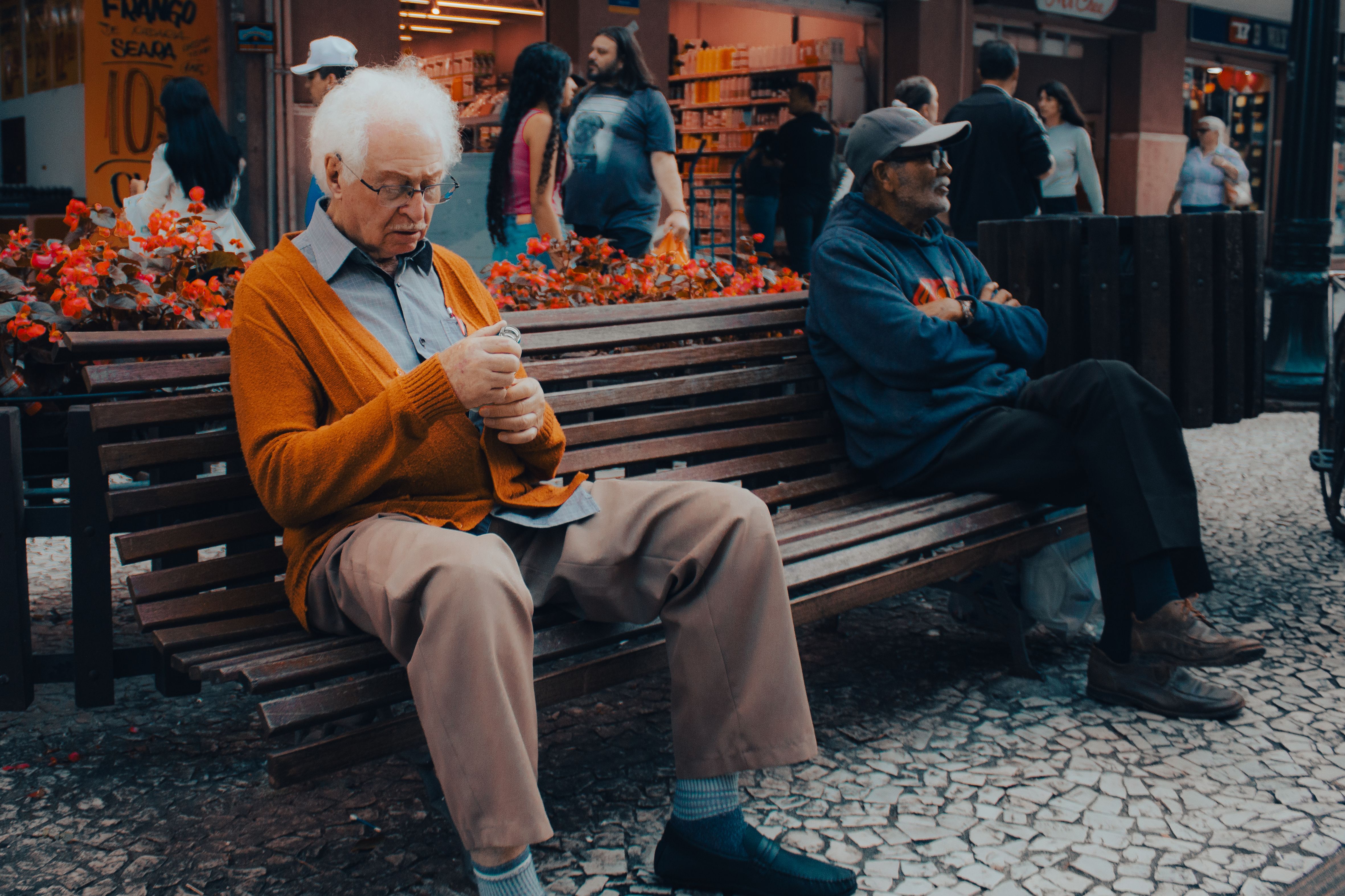 Two Men Sitting on a Bench · Free Stock Photo