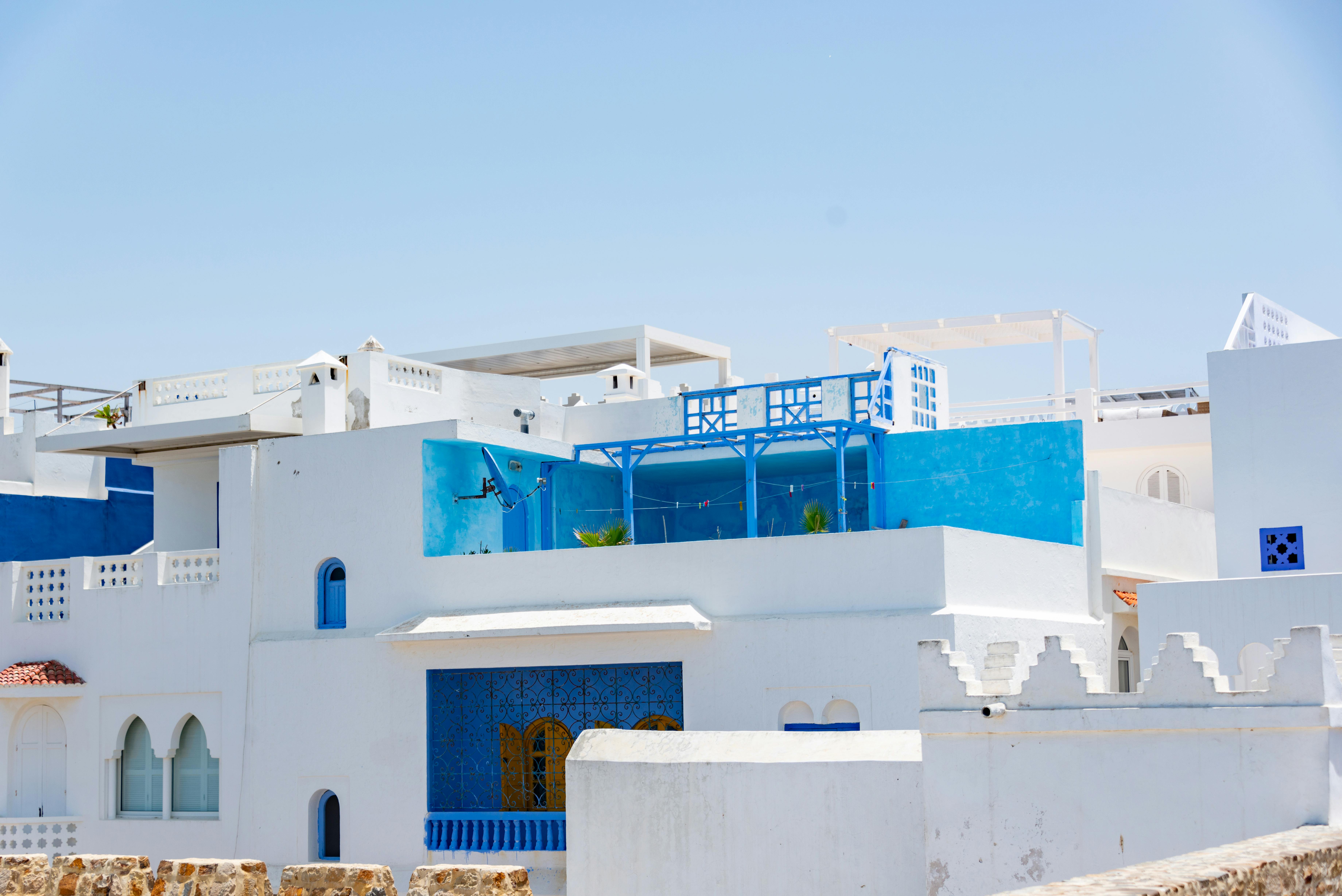 View of White and Blue Buildings in a Town · Free Stock Photo