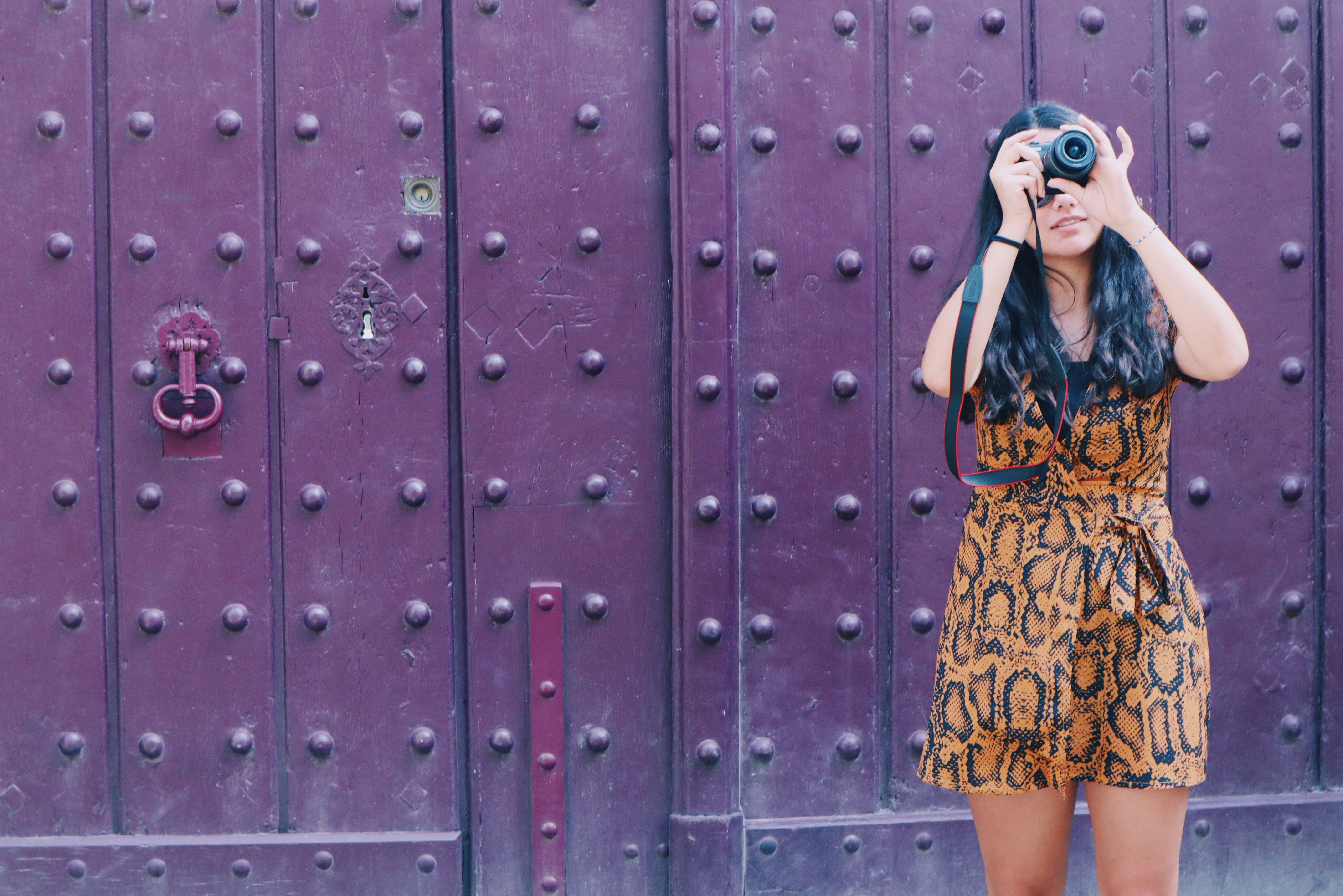 Woman Using Camera · Free Stock Photo