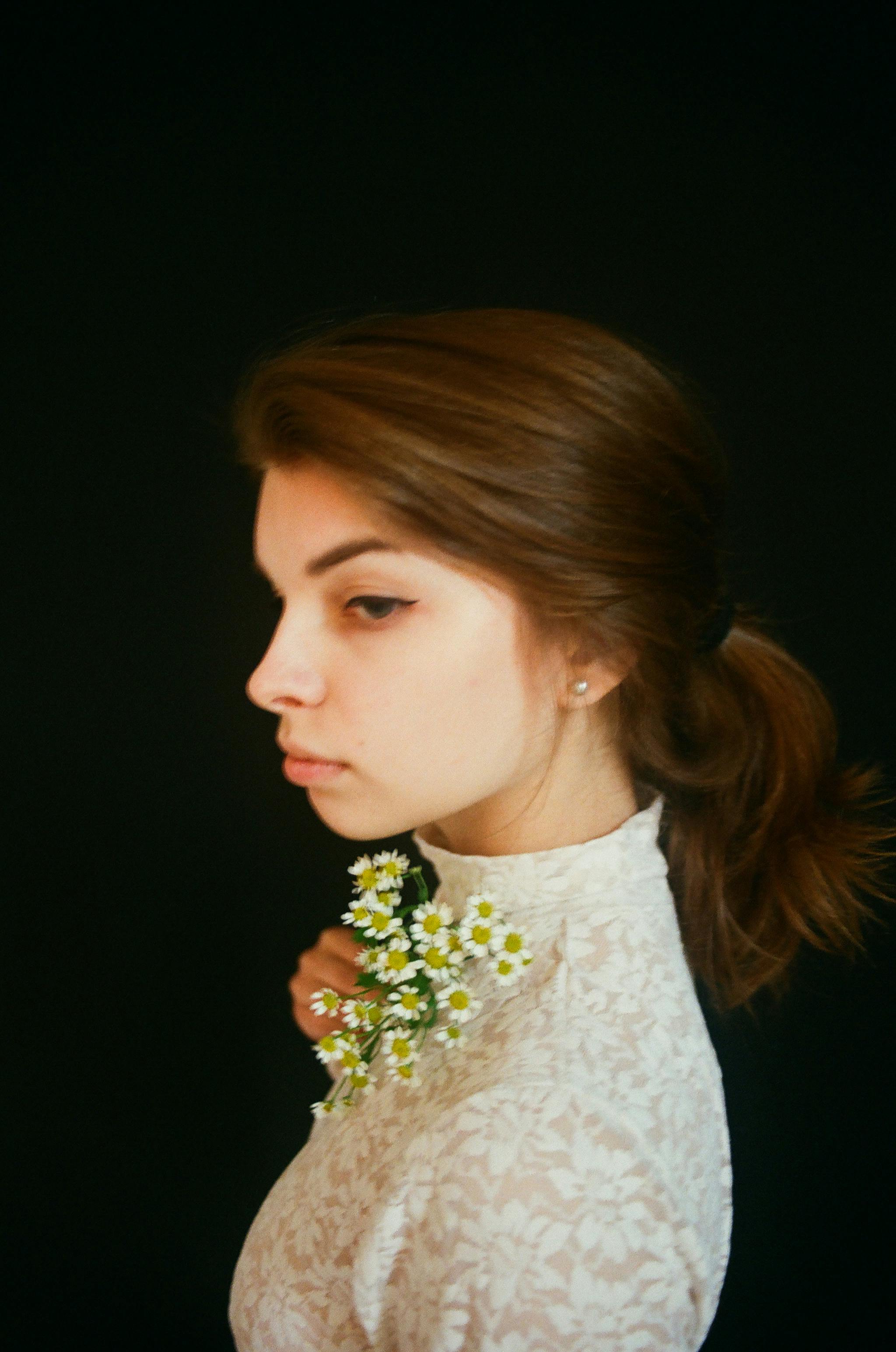 Photo of a Woman Facing Sideways · Free Stock Photo