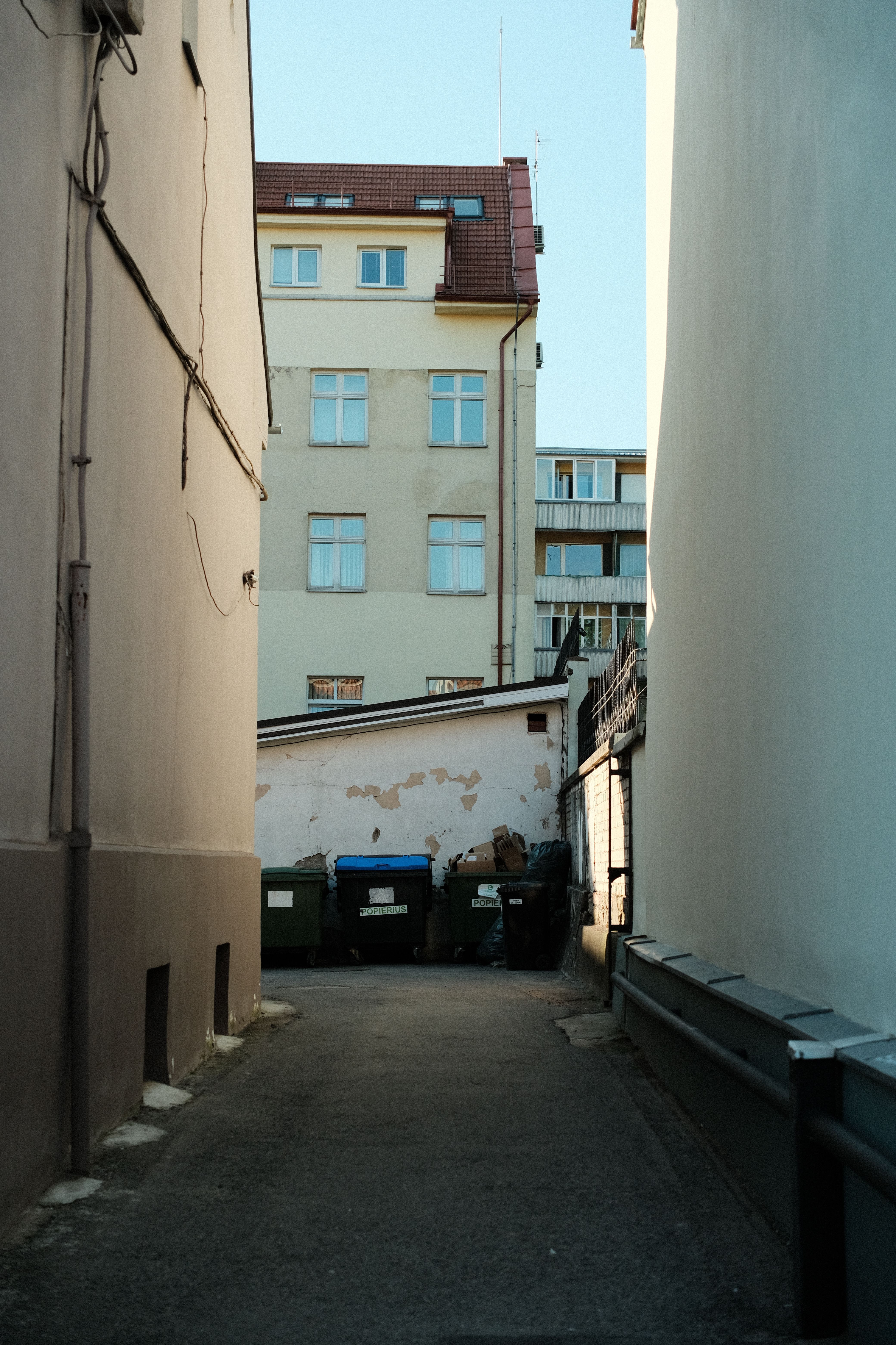 View of an Empty Alley between Buildings in a City · Free Stock Photo
