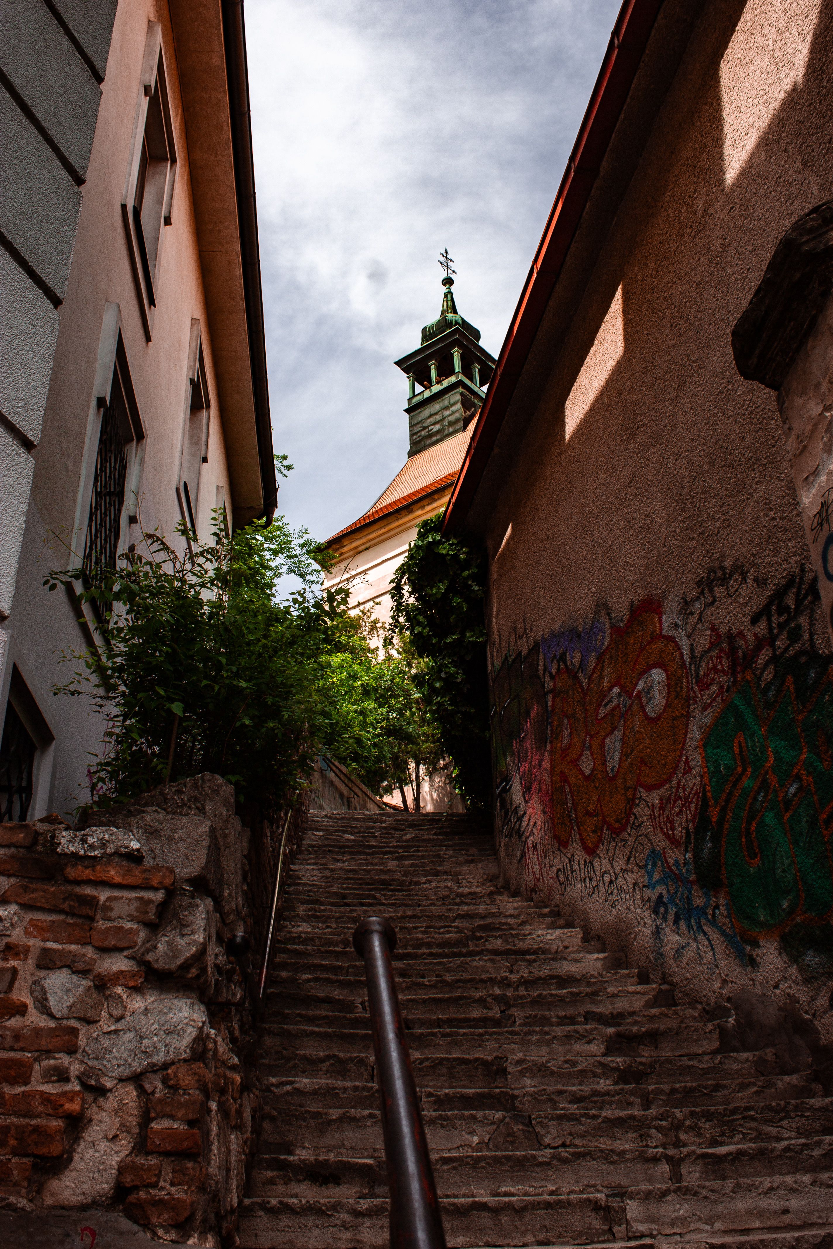 Church Tower over Stairs in Town · Free Stock Photo