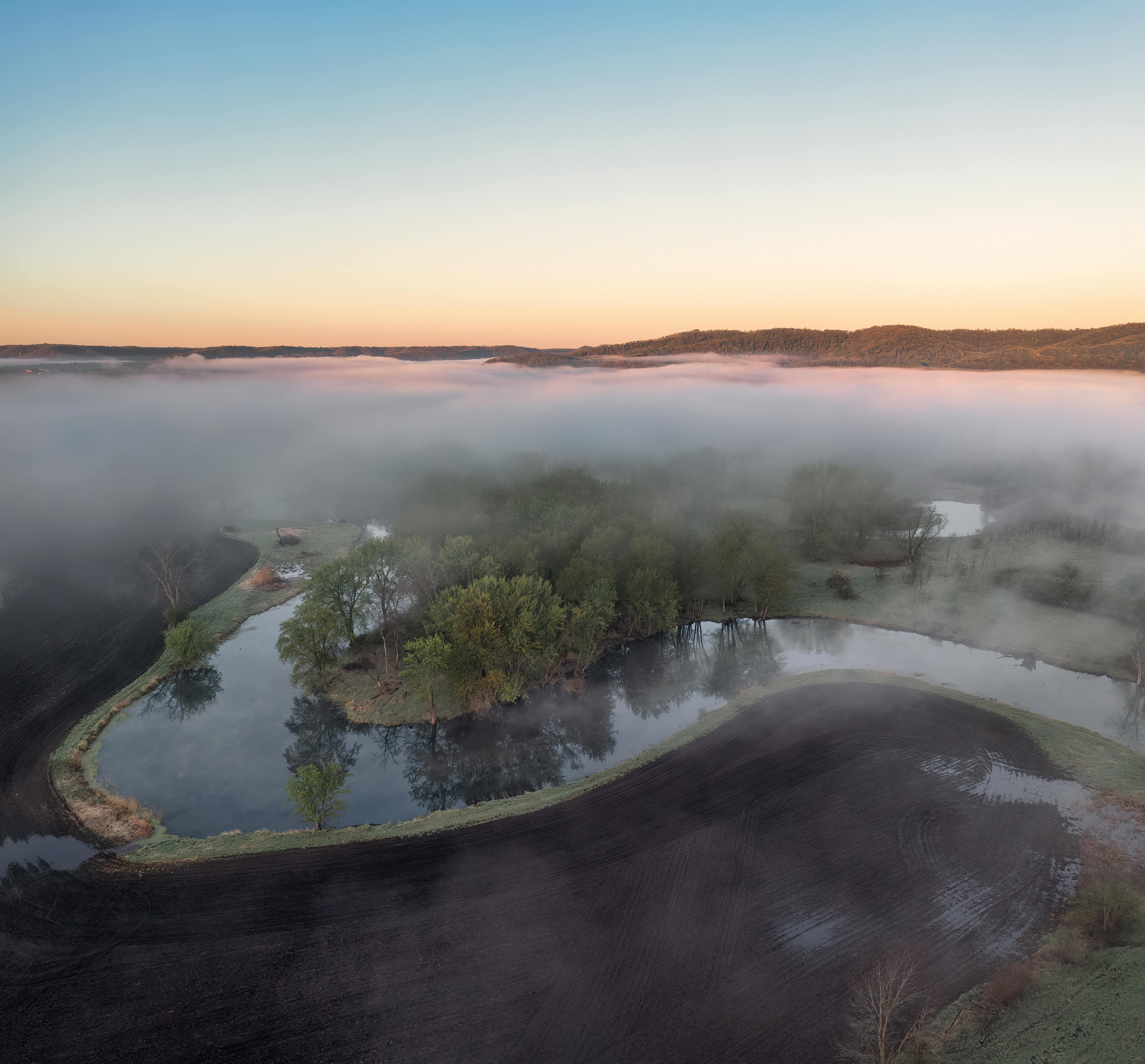 Aerial View of a River and Fields at Sunset · Free Stock Photo